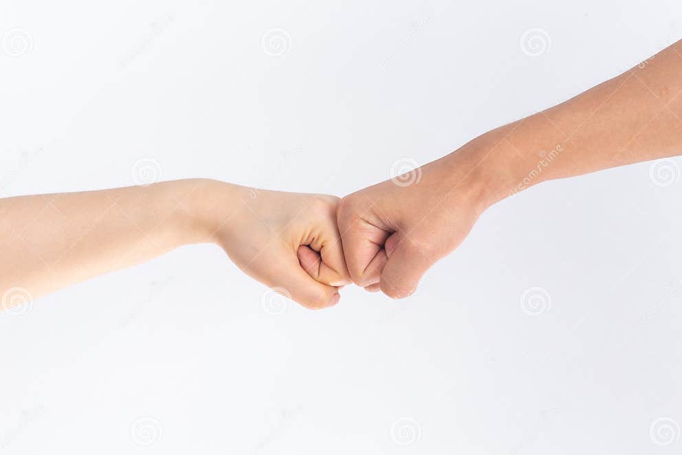 Fist Bump Together in the Air Stock Image - Image of hold, bump: 190358763