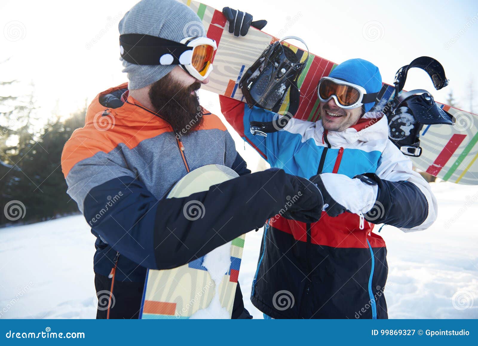 Two male snowboarders stock image. Image of hill, snow - 99869327