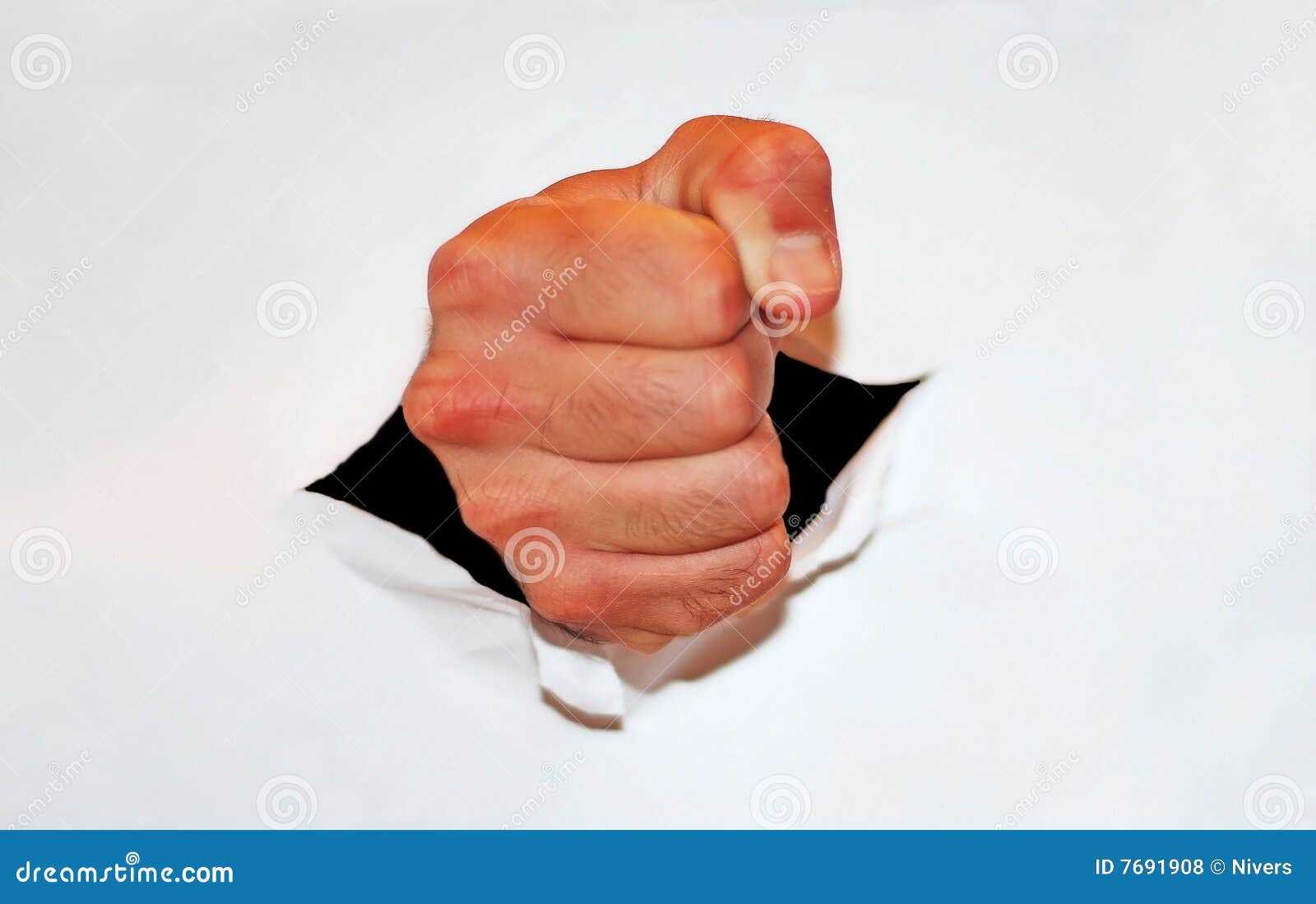 Fist through paper stock photo. Image of hand, concept - 7691908