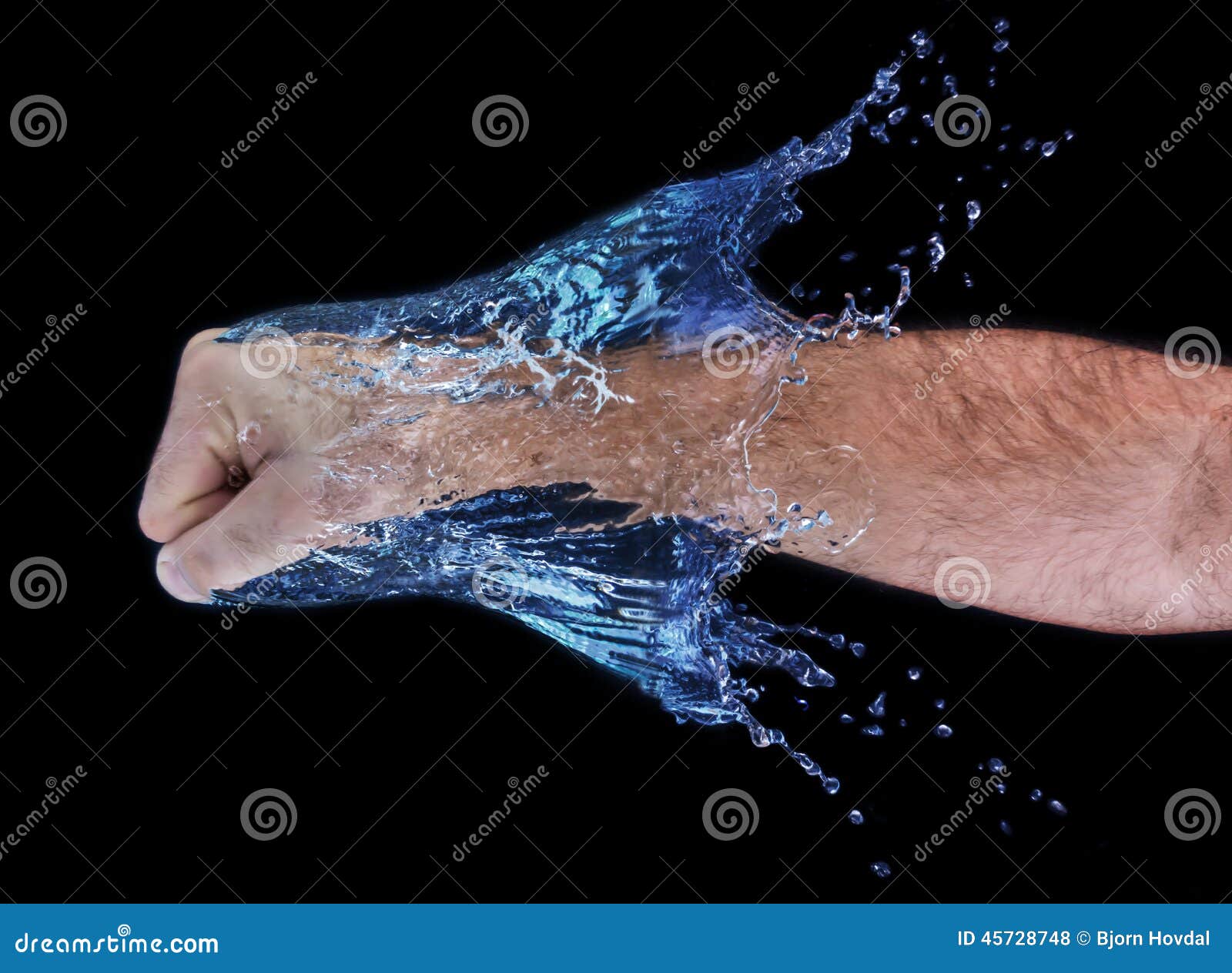 Fist through water stock photo. Image of clench, drops - 45728748