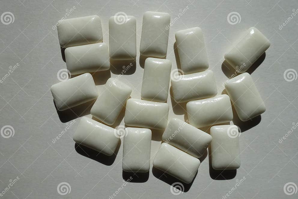 Fistful of White Pieces of Chewing Gum from Above Stock Photo - Image ...