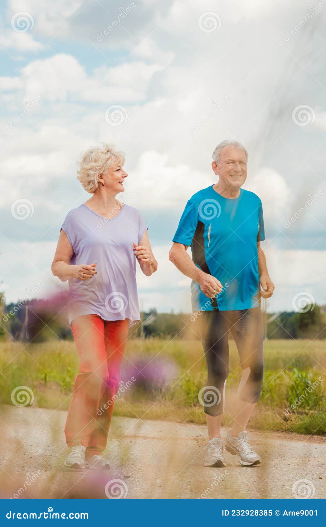 Fit and Active Senior Couple Running Outdoors As Exercise Stock Image ...