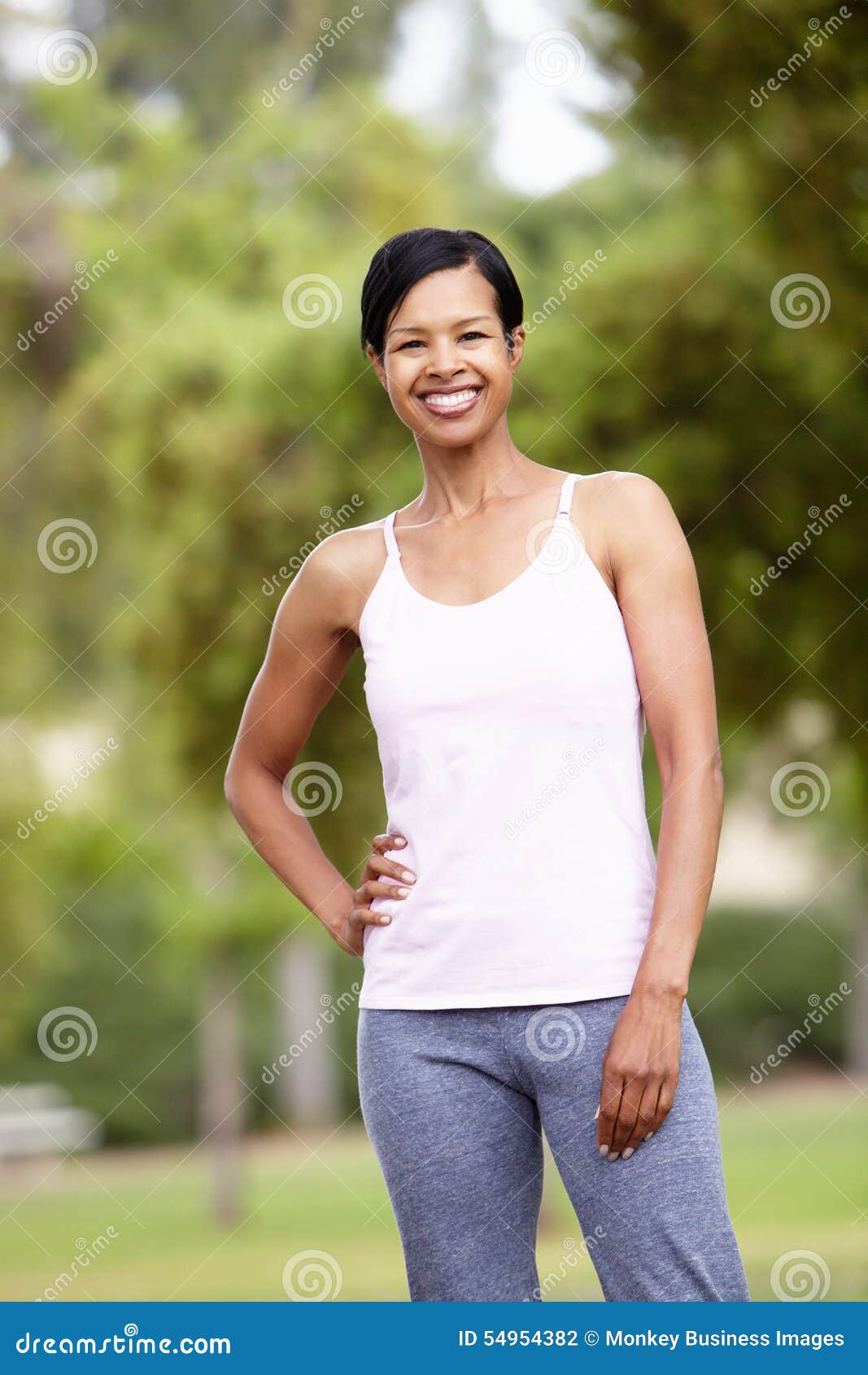 Fit, active woman in park stock photo. Image of foreground - 54954382