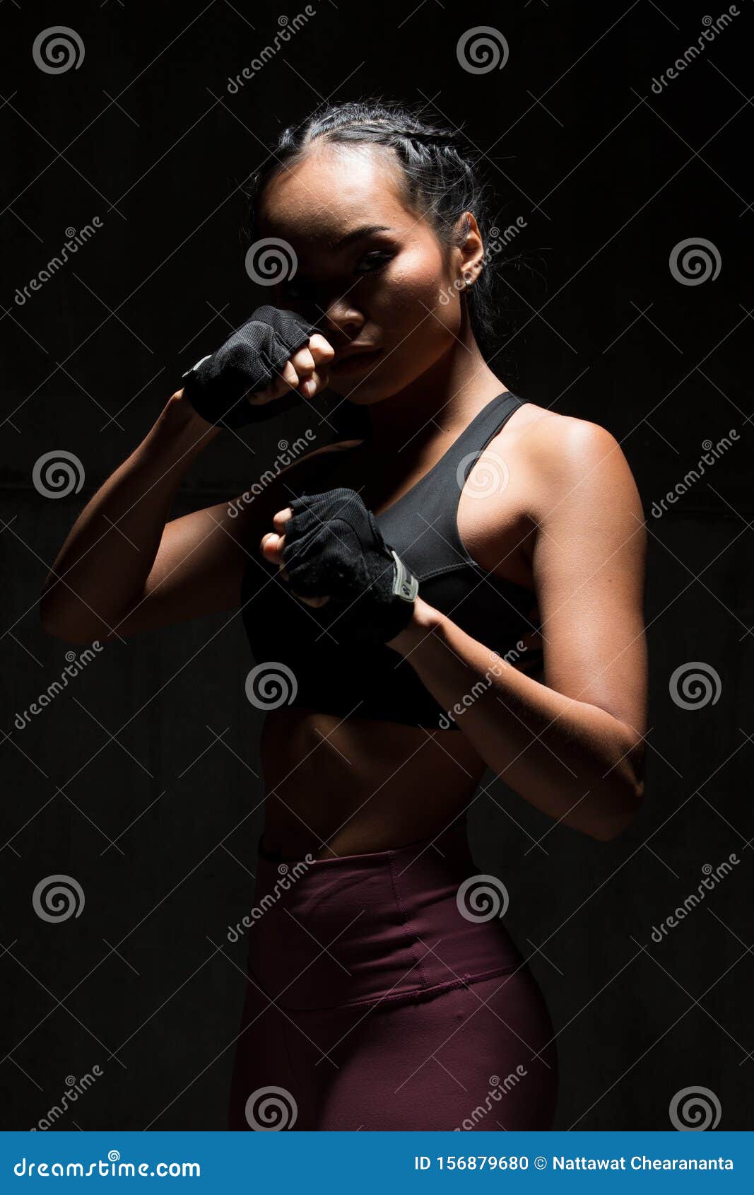 Fit woman in fighting pose stock photo. Image of endurance - 156879680