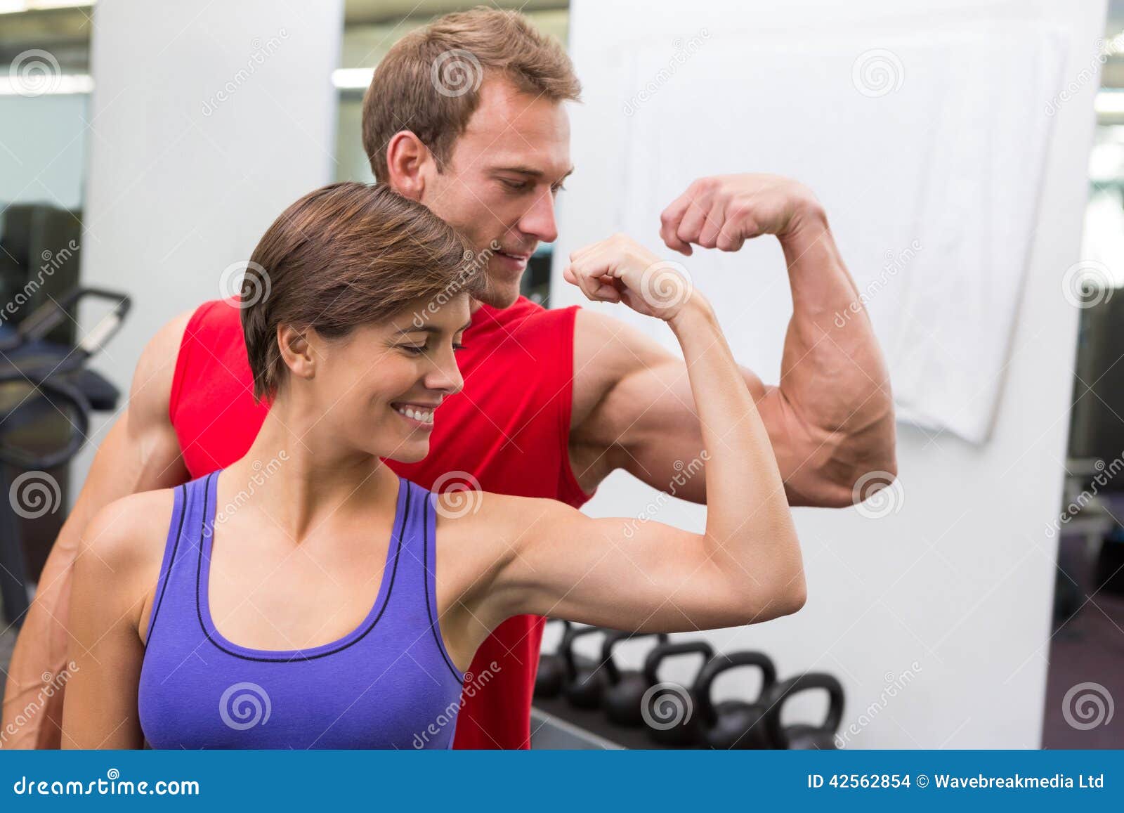 Fit Attractive Couple Flexing Their Biceps Stock Photo - Image of ...