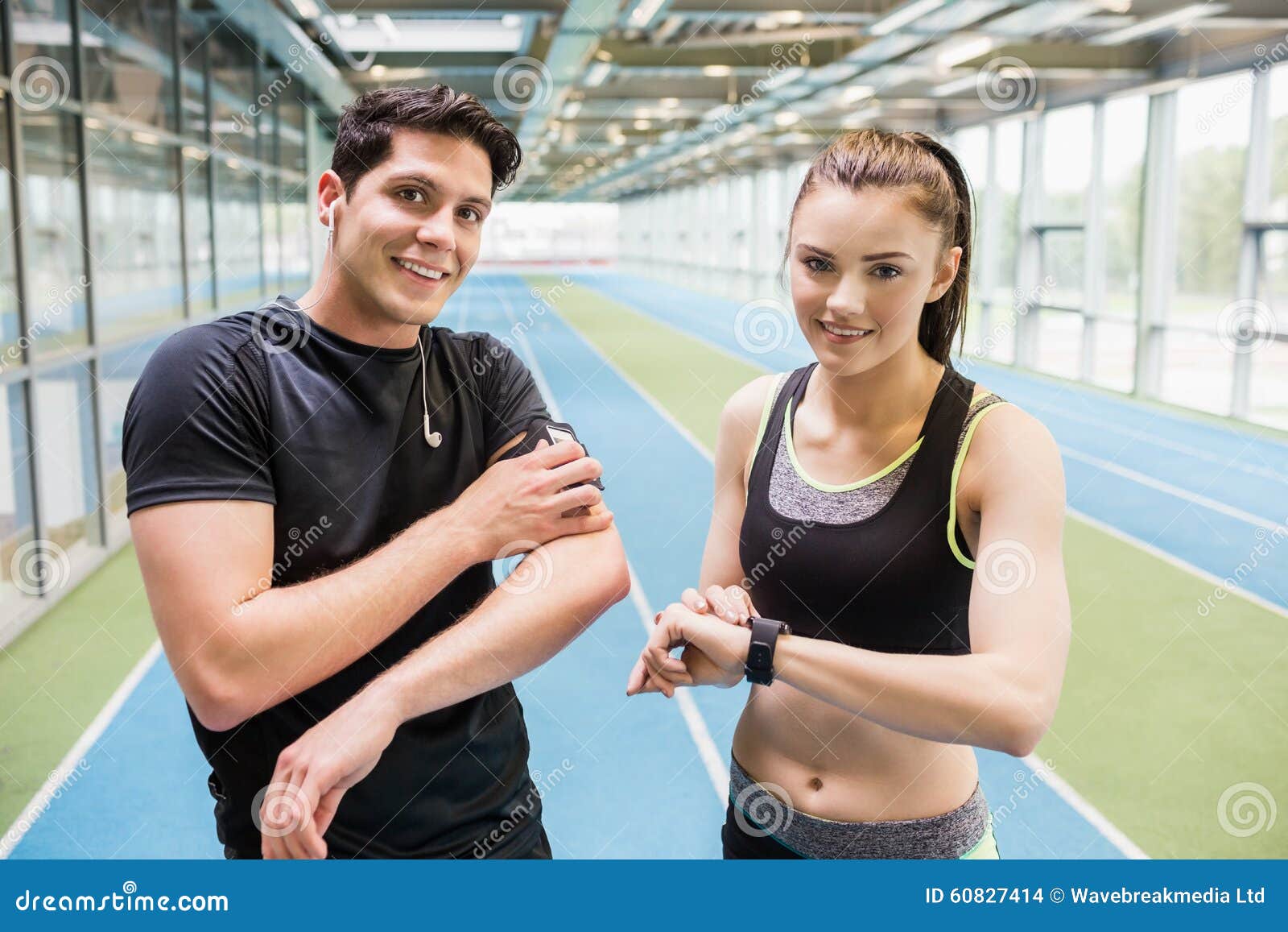 Fit Couple on the Indoor Track Stock Photo - Image of happy, holding ...