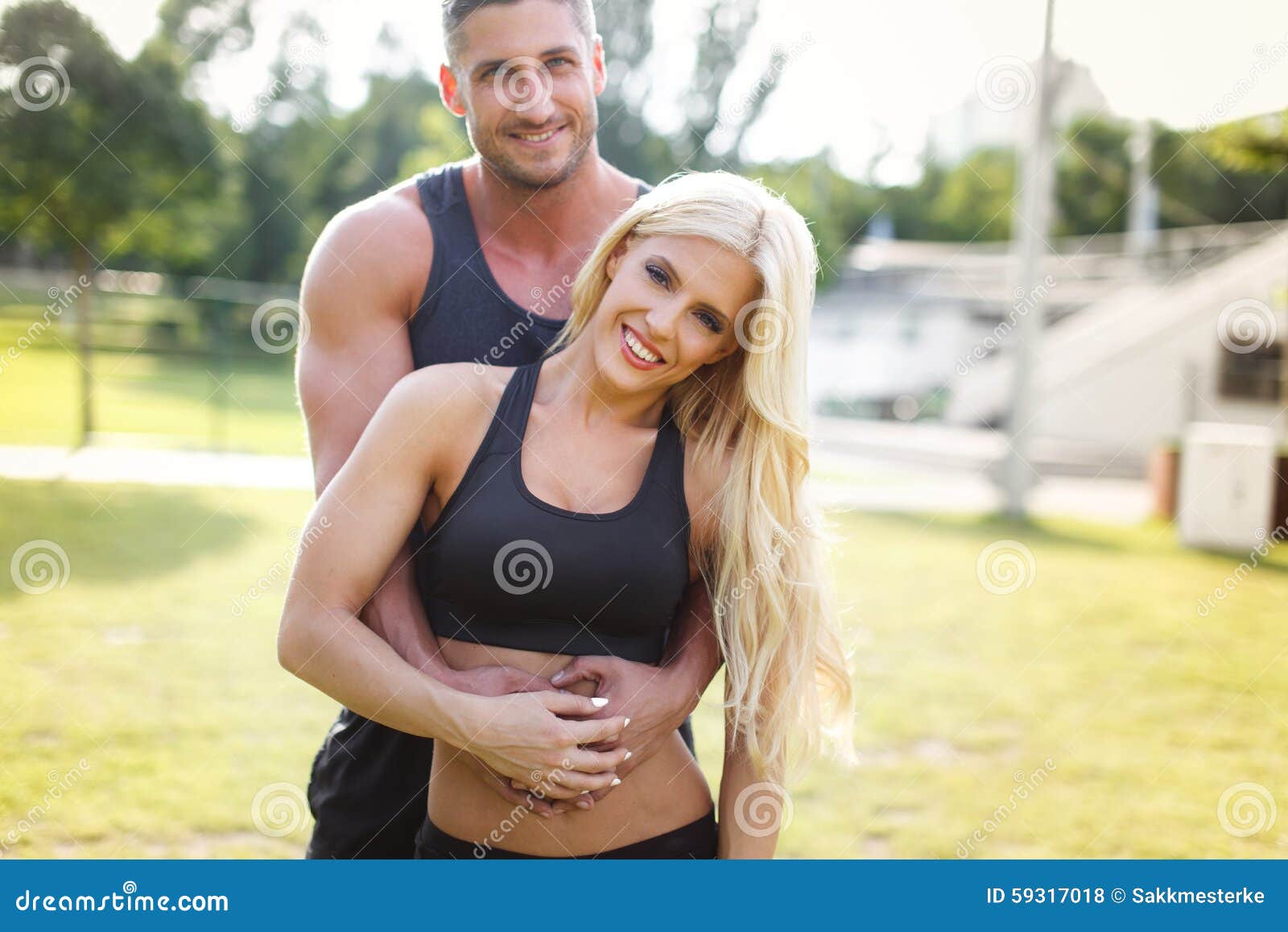 Fit couple in the park stock photo. Image of active, parkland - 59317018