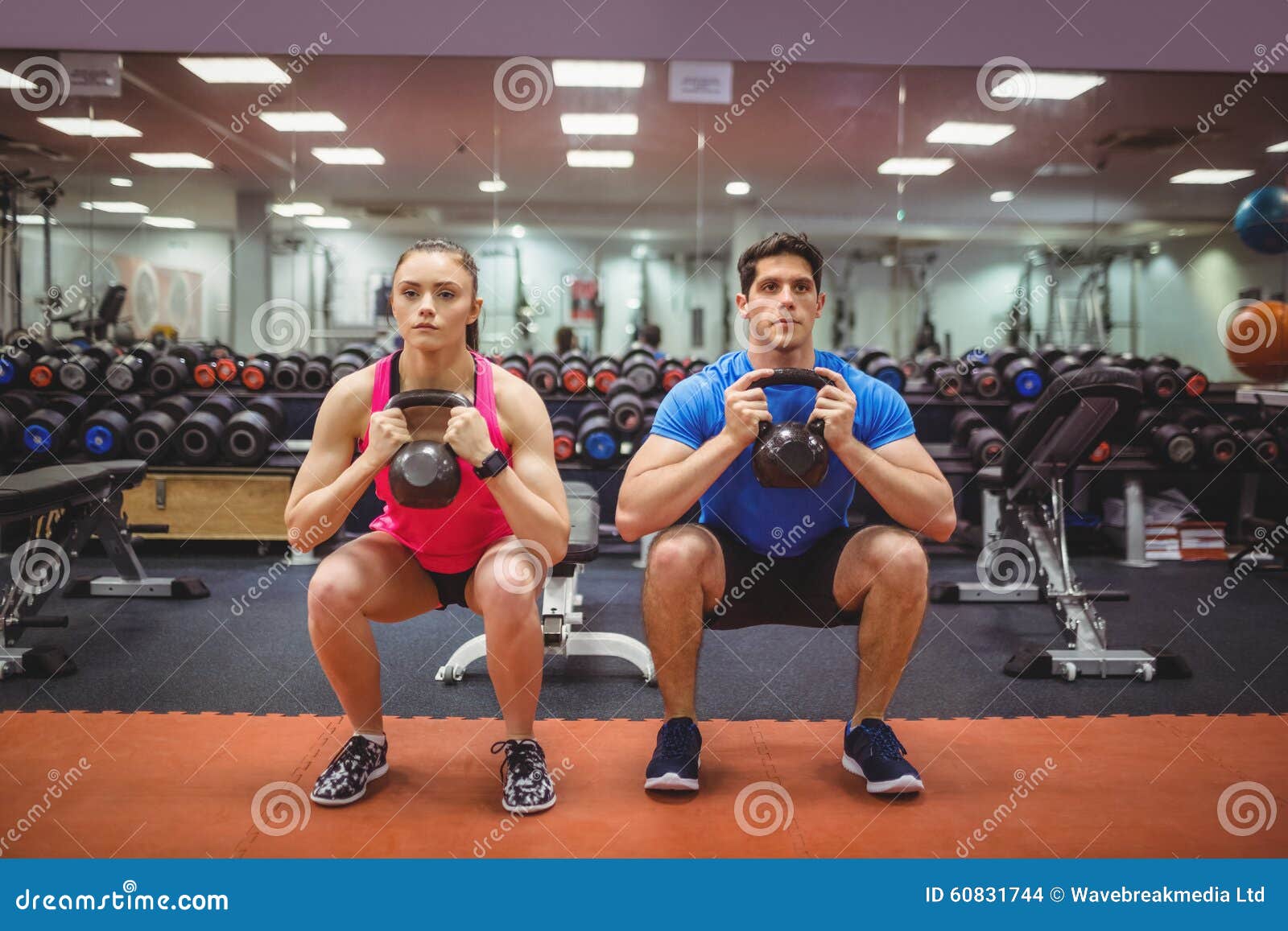 Fit Couple Working Out in Weights Room Stock Photo - Image of ...
