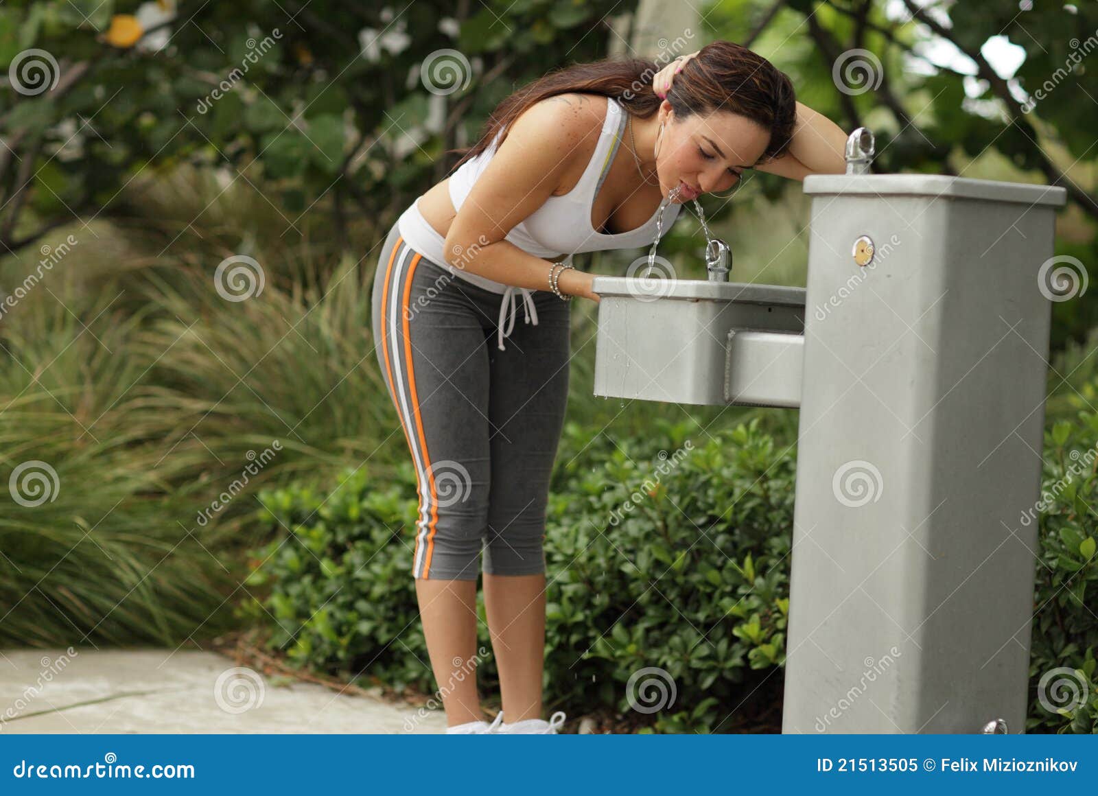 Fit female drinking water stock image. Image of color - 21513505