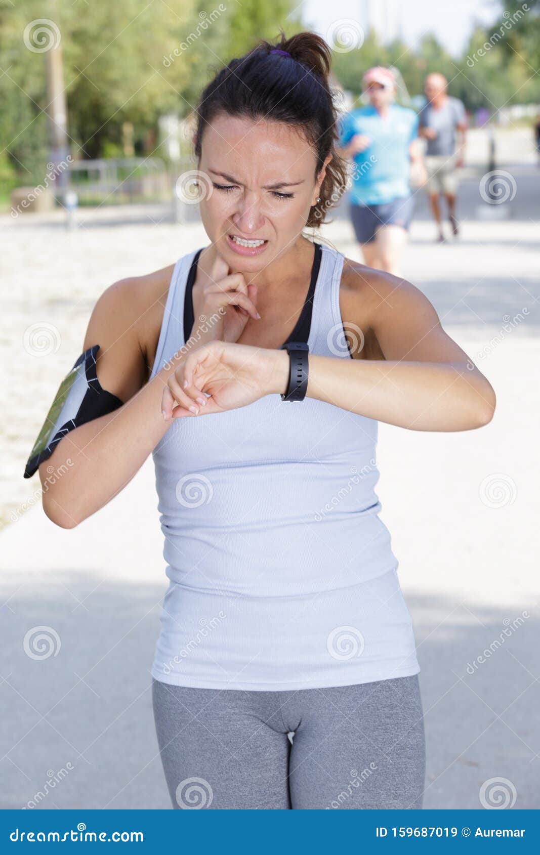 Fit Female Runner Looking at Watch Stock Image - Image of exercise ...