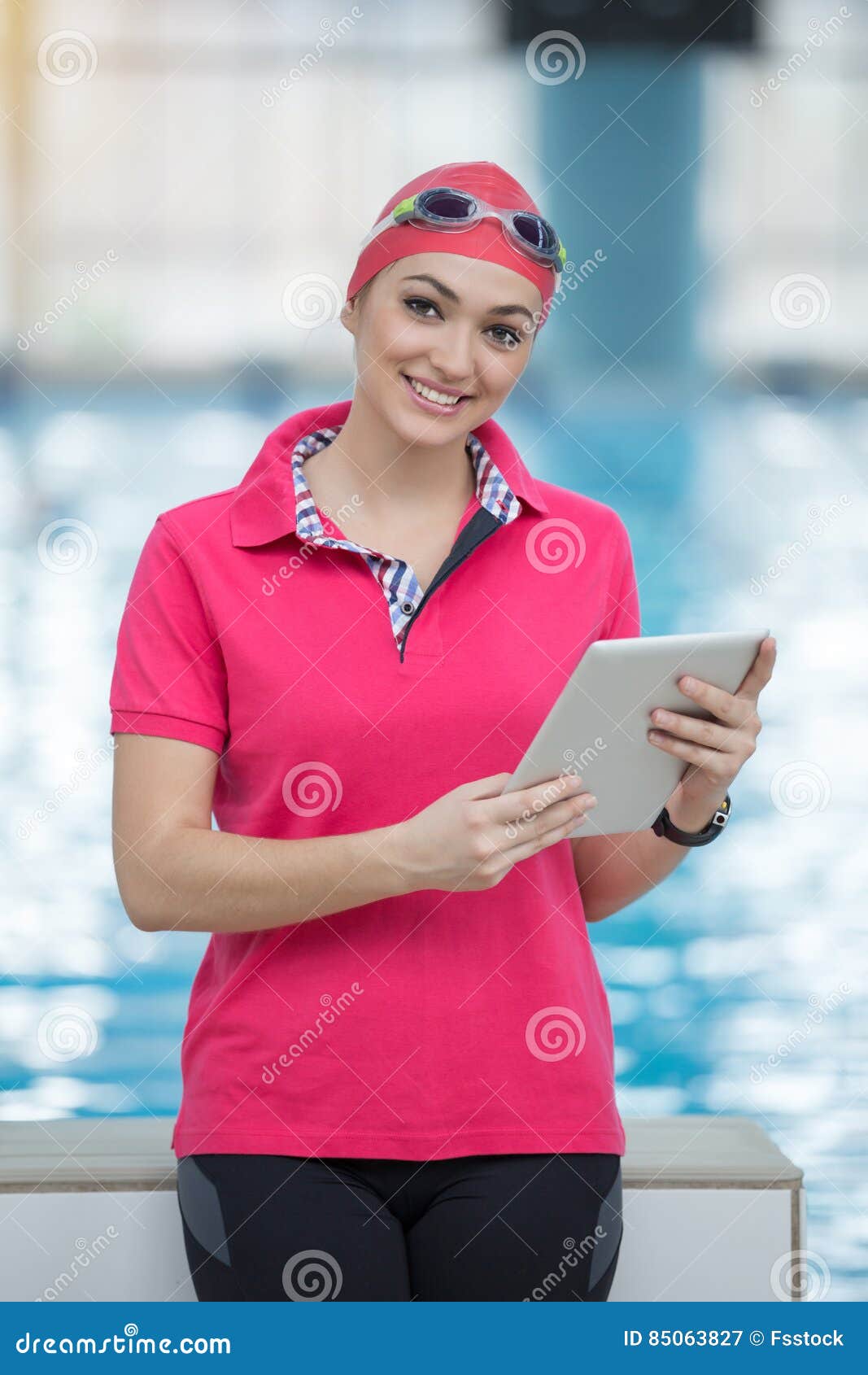 Fit Female Swimming Trainer with Tablet at the Pool Stock Image - Image ...