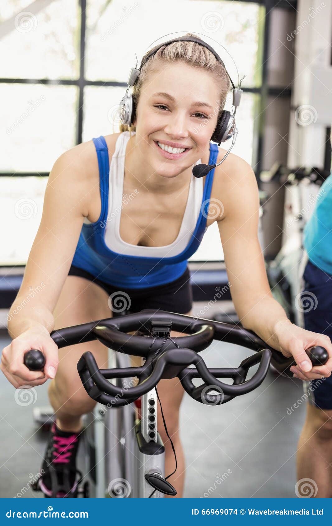 Fit Group of People Using Exercise Bike Together Stock Photo - Image of ...