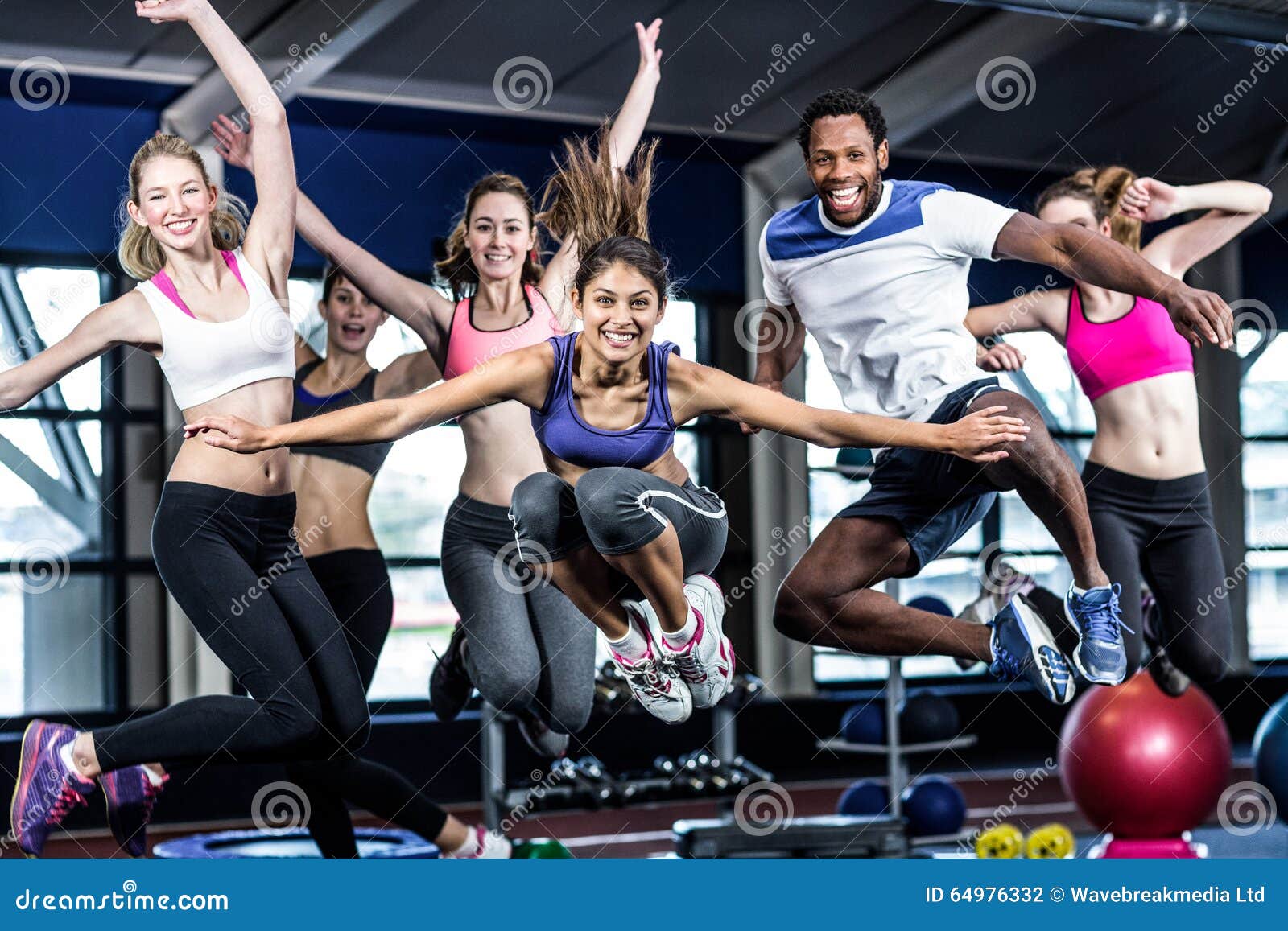 Fit Group Smiling and Jumping Stock Photo - Image of exercise, slim ...