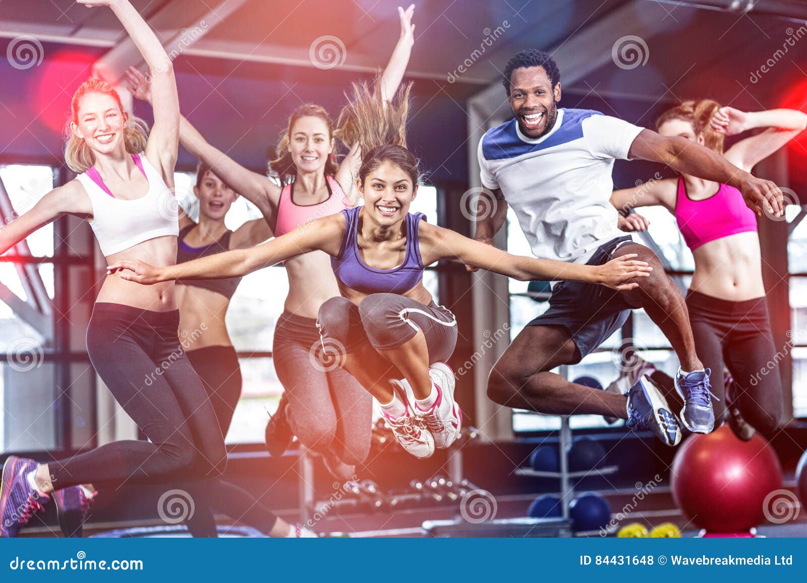 Fit Group Smiling and Jumping Stock Photo - Image of cheerful, activity ...