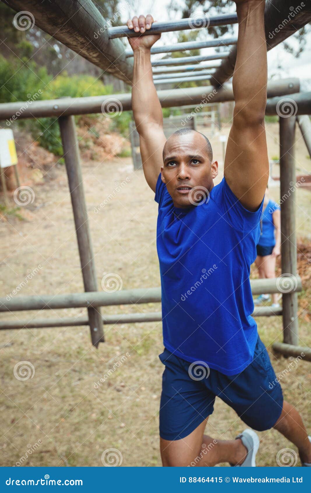 Fit Man Climbing Monkey Bars Stock Image - Image of camp, flexibility ...
