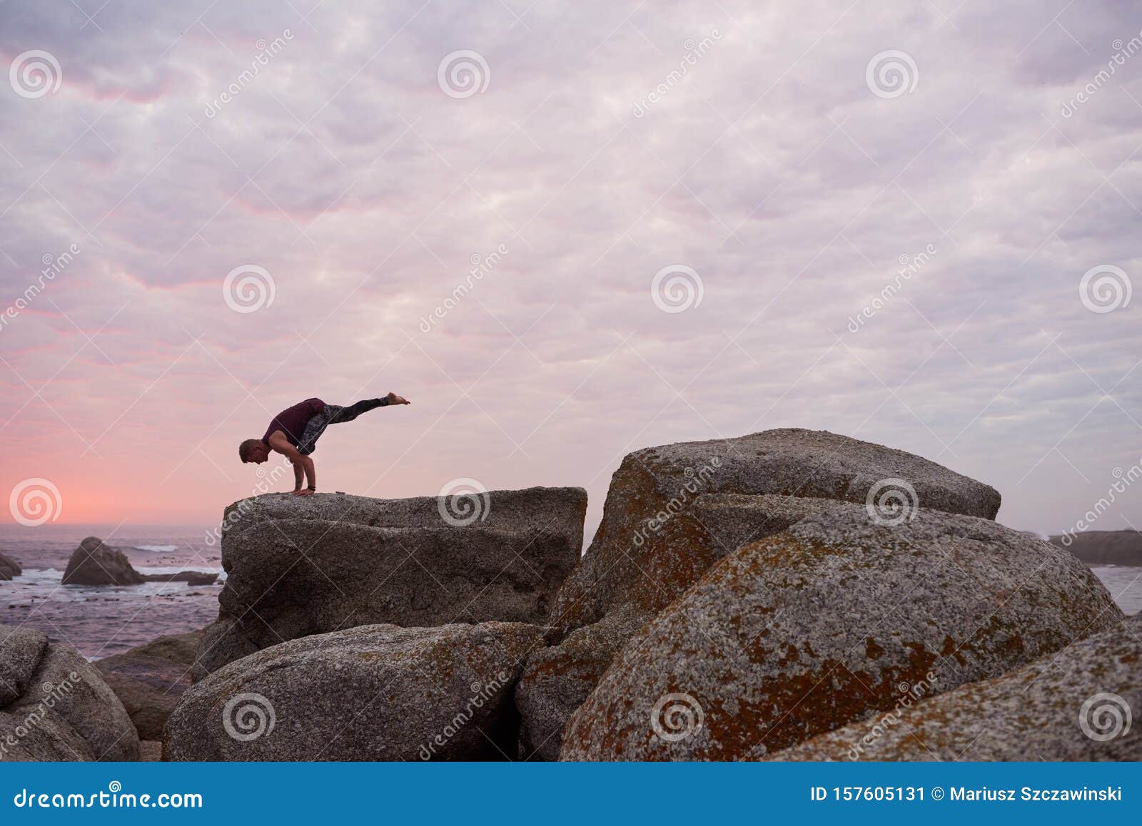 Man Doing the One Legged Crow Pose by the Ocean Stock Image - Image of ...