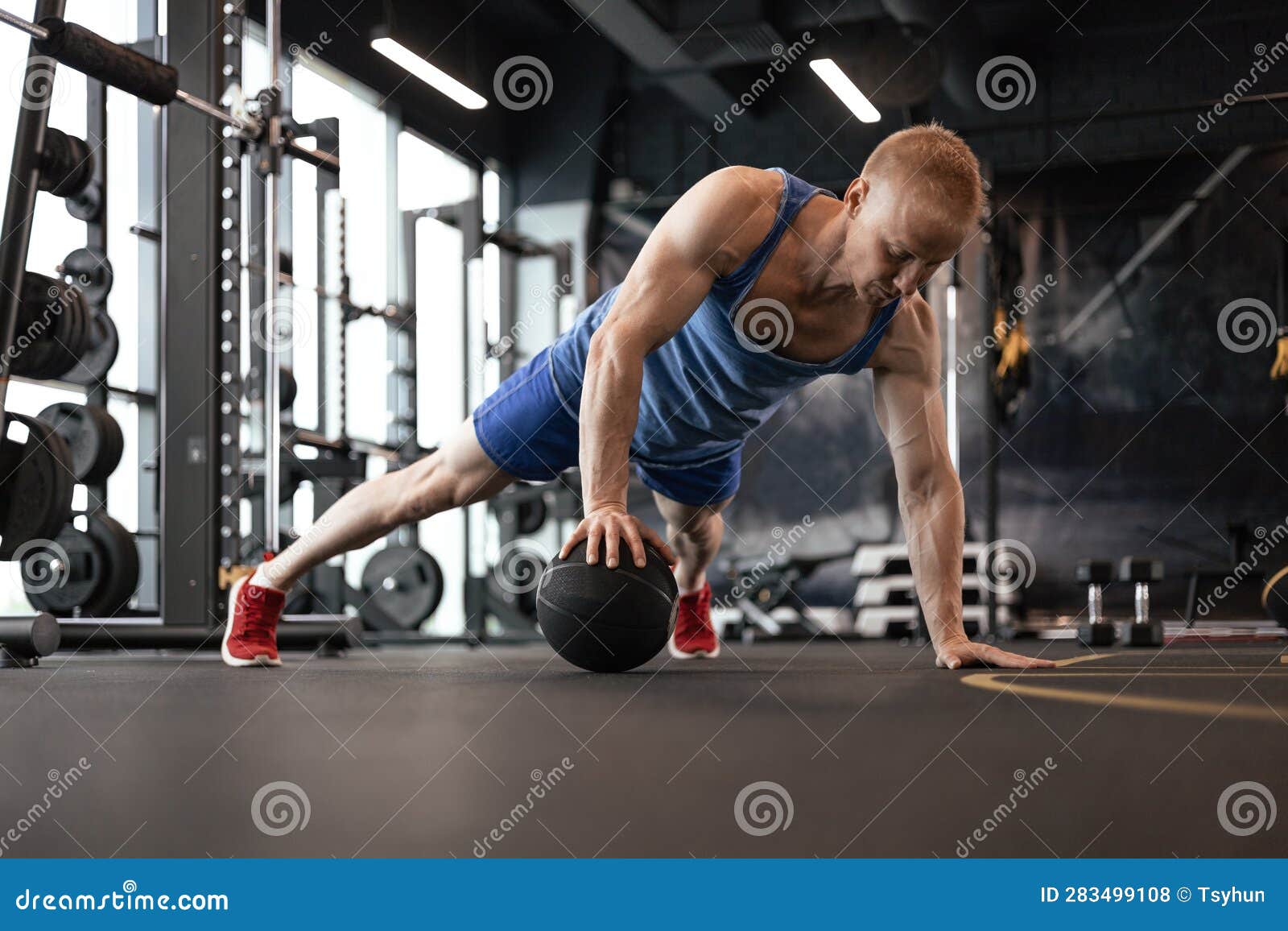 Fit Man Doing Push Ups on Medicine Ball at the Gym. Stock Photo - Image ...