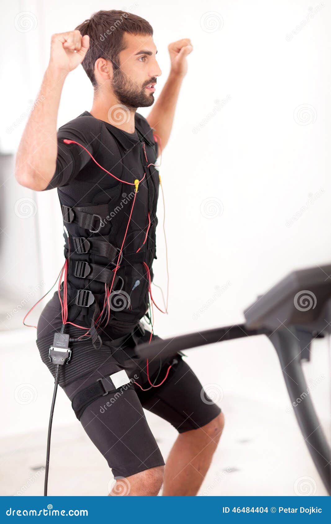 Fit Man Exercise on Electro Muscular Stimulation Machine Stock Photo ...