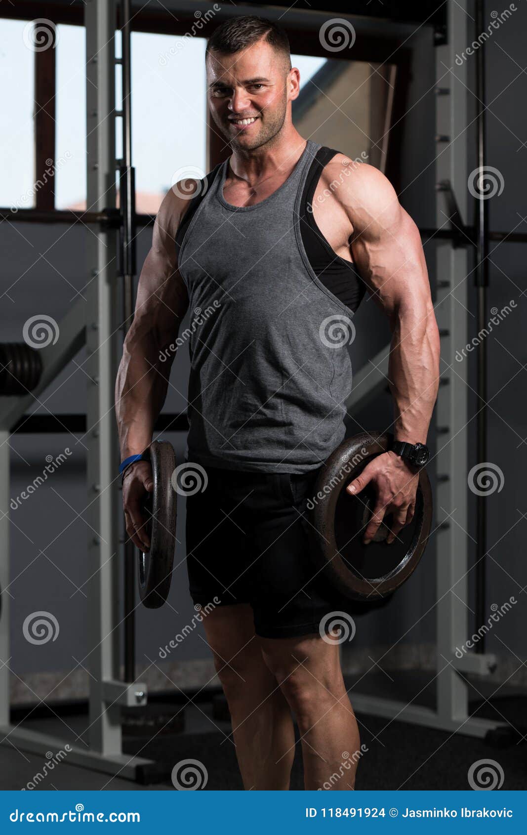 Fit Man Holding Weights in Hand Stock Photo - Image of people ...