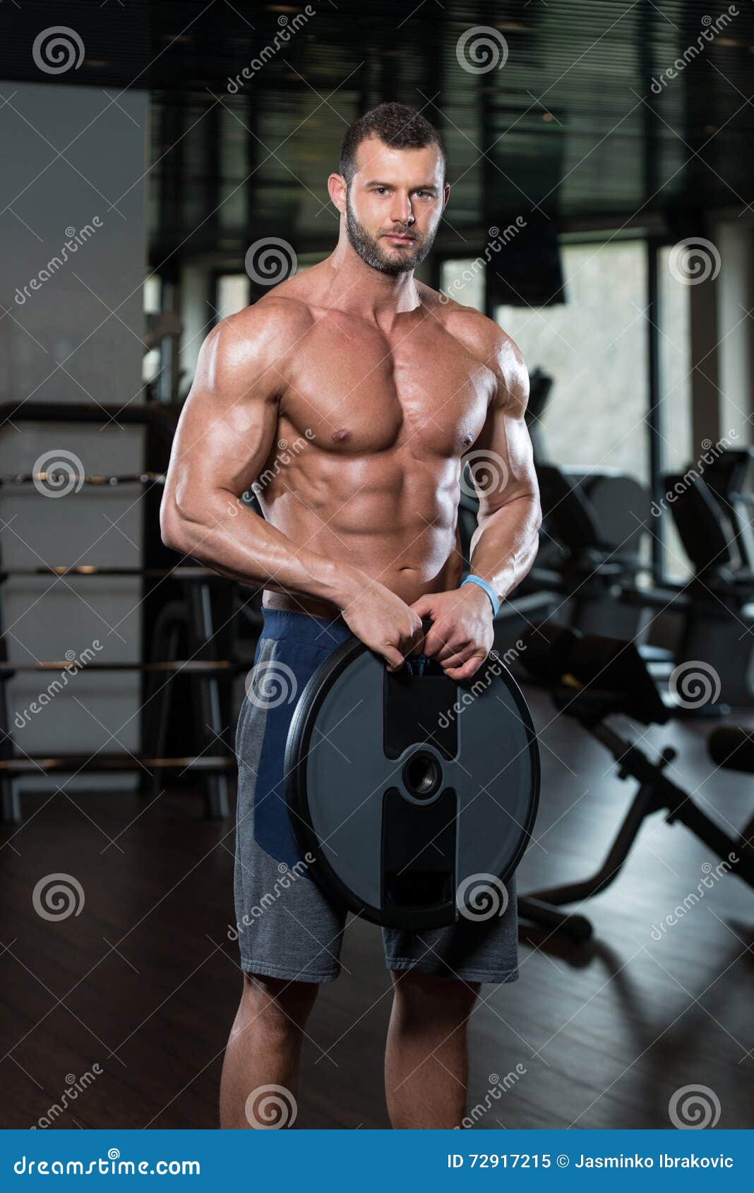 Fit Man Holding Weights in Hand Stock Image - Image of background ...
