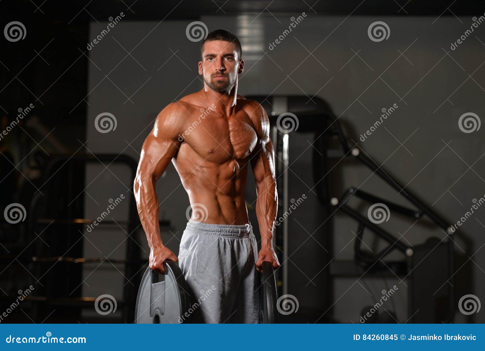 Fit Man Holding Weights in Hand Stock Image - Image of adult, caucasian ...