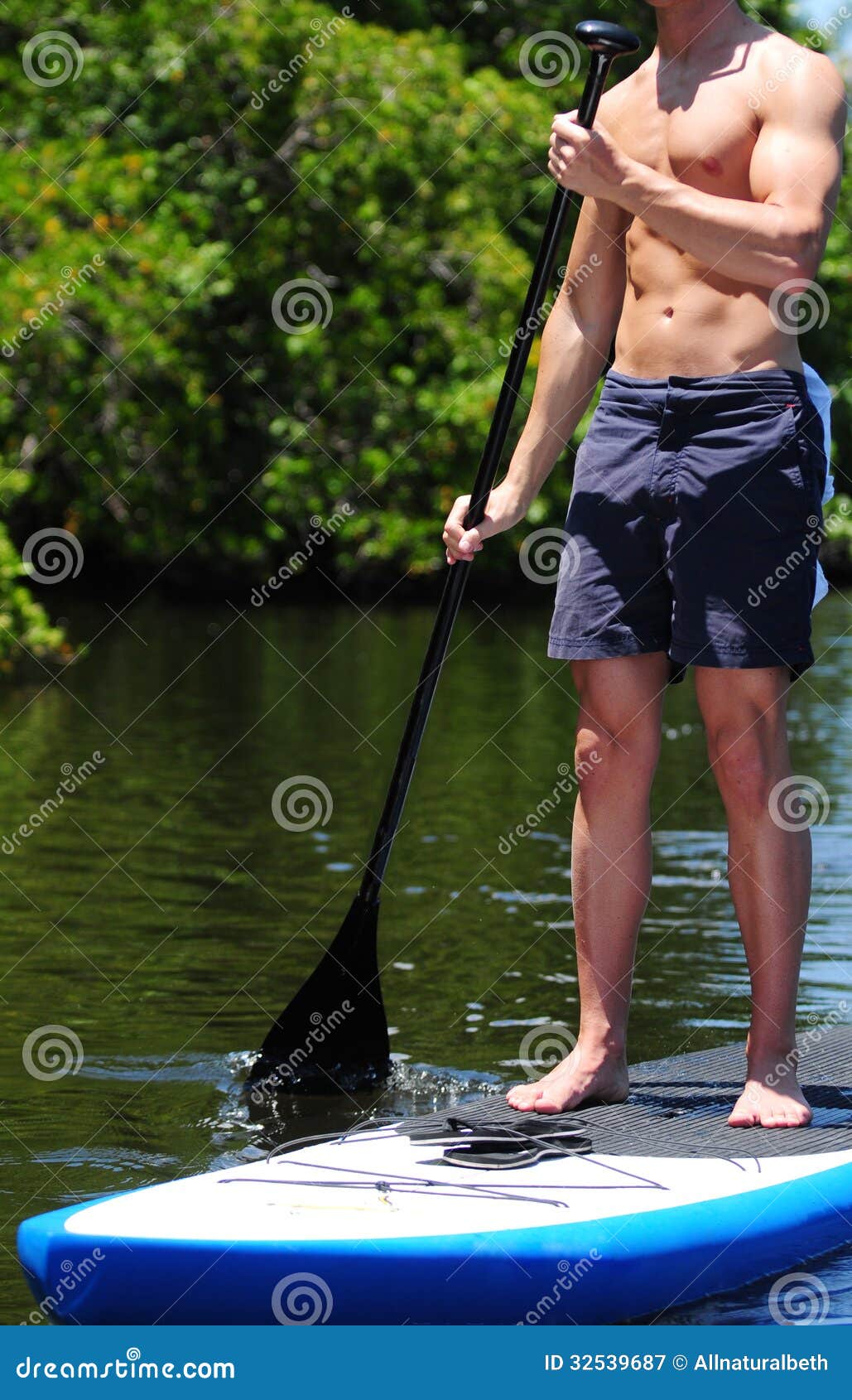 Fit man on paddle board stock image. Image of water, sport - 32539687