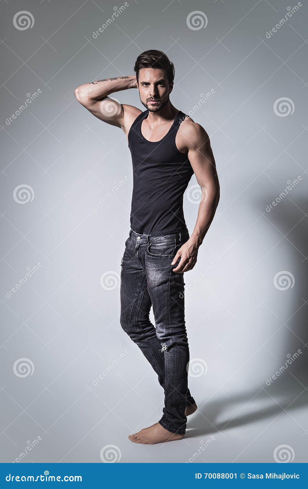 Fit Man Posing in Jeans and Shirt Stock Image - Image of model ...