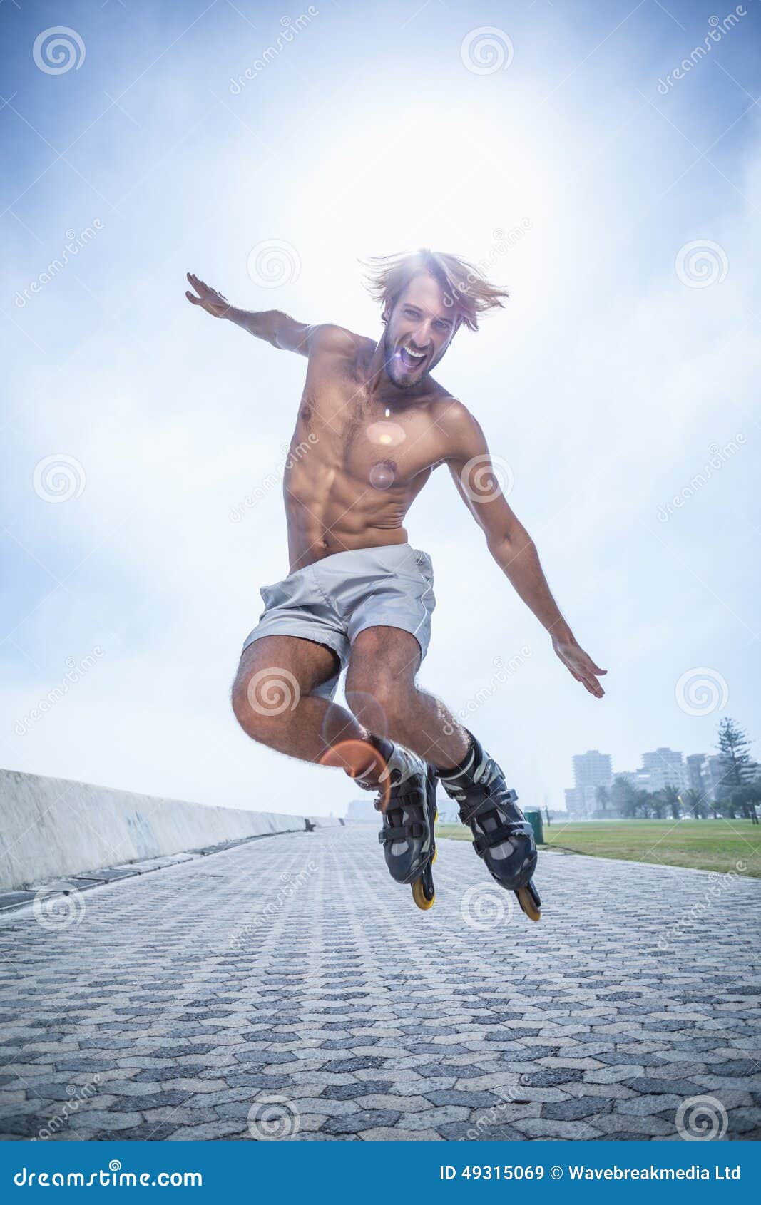 Fit Man Rollerblading on the Promenade Stock Image - Image of blue ...