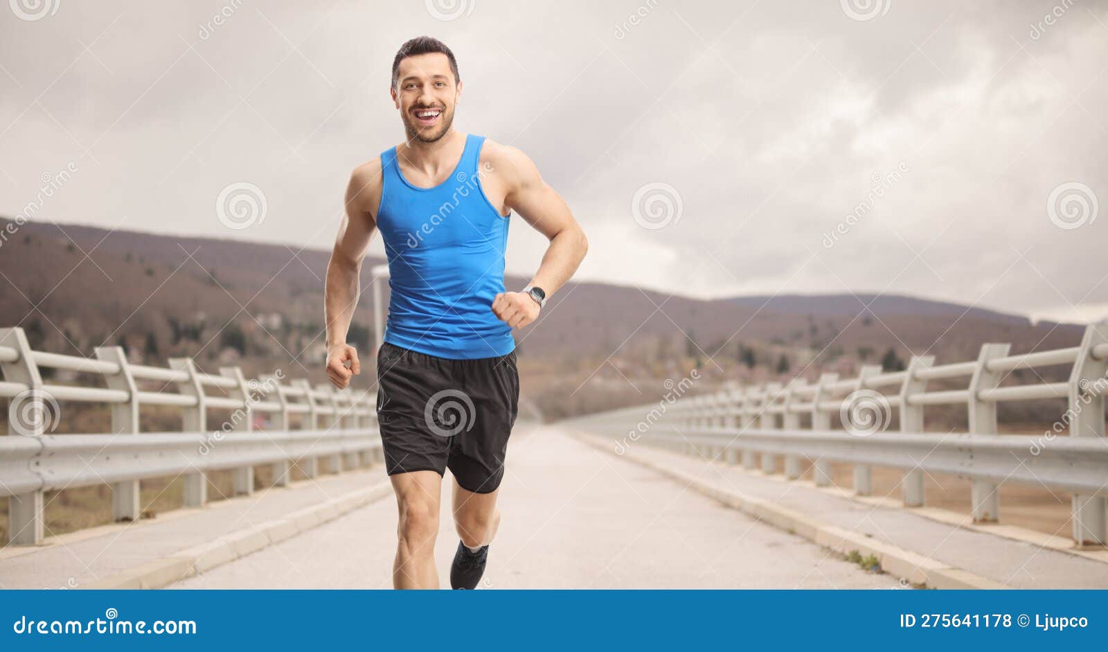 Fit Man Running on a Bridge Stock Photo - Image of race, cloudy: 275641178