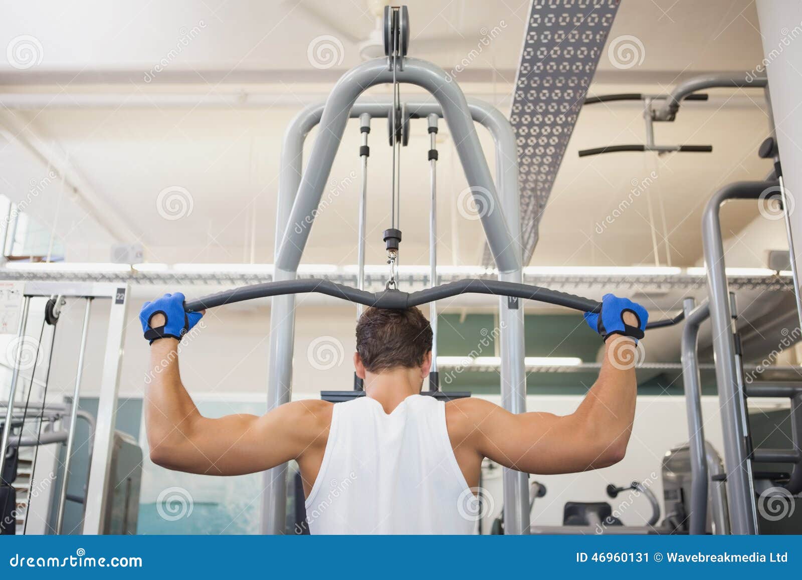 Fit Man Using Weights Machine for Arms Stock Image - Image of healthy ...