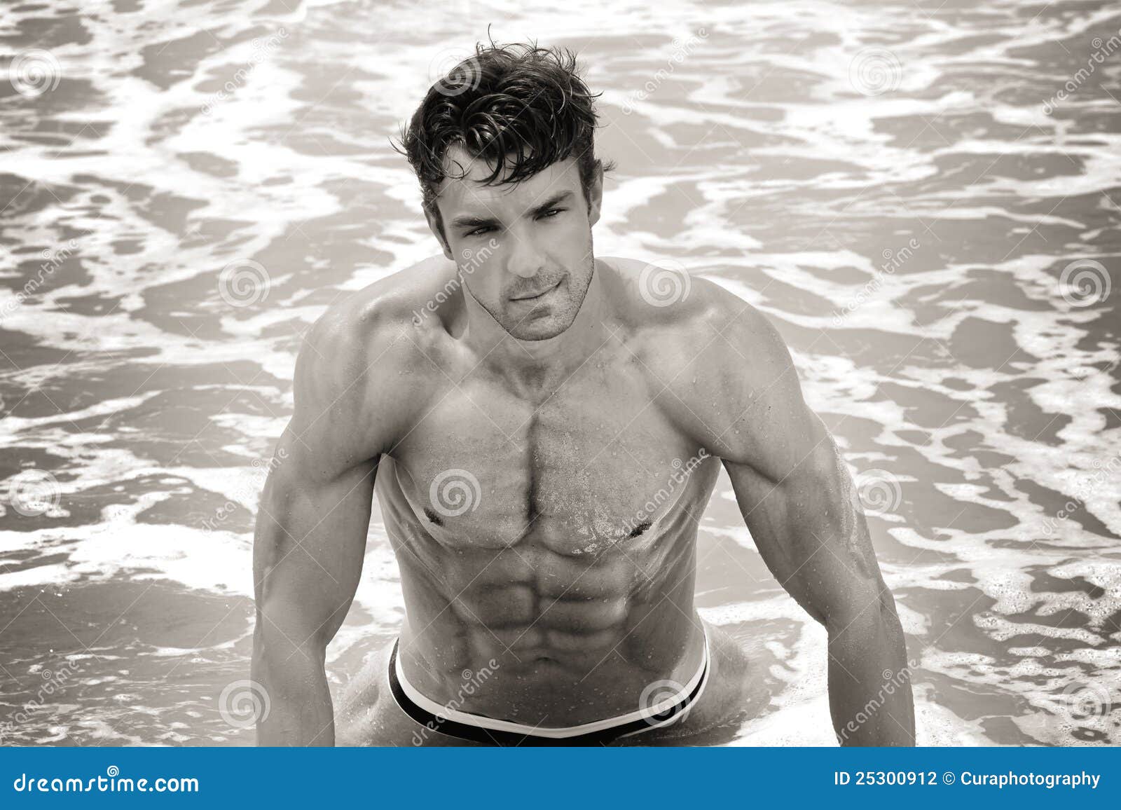 Fit man in water stock photo. Image of muscle, looking - 25300912