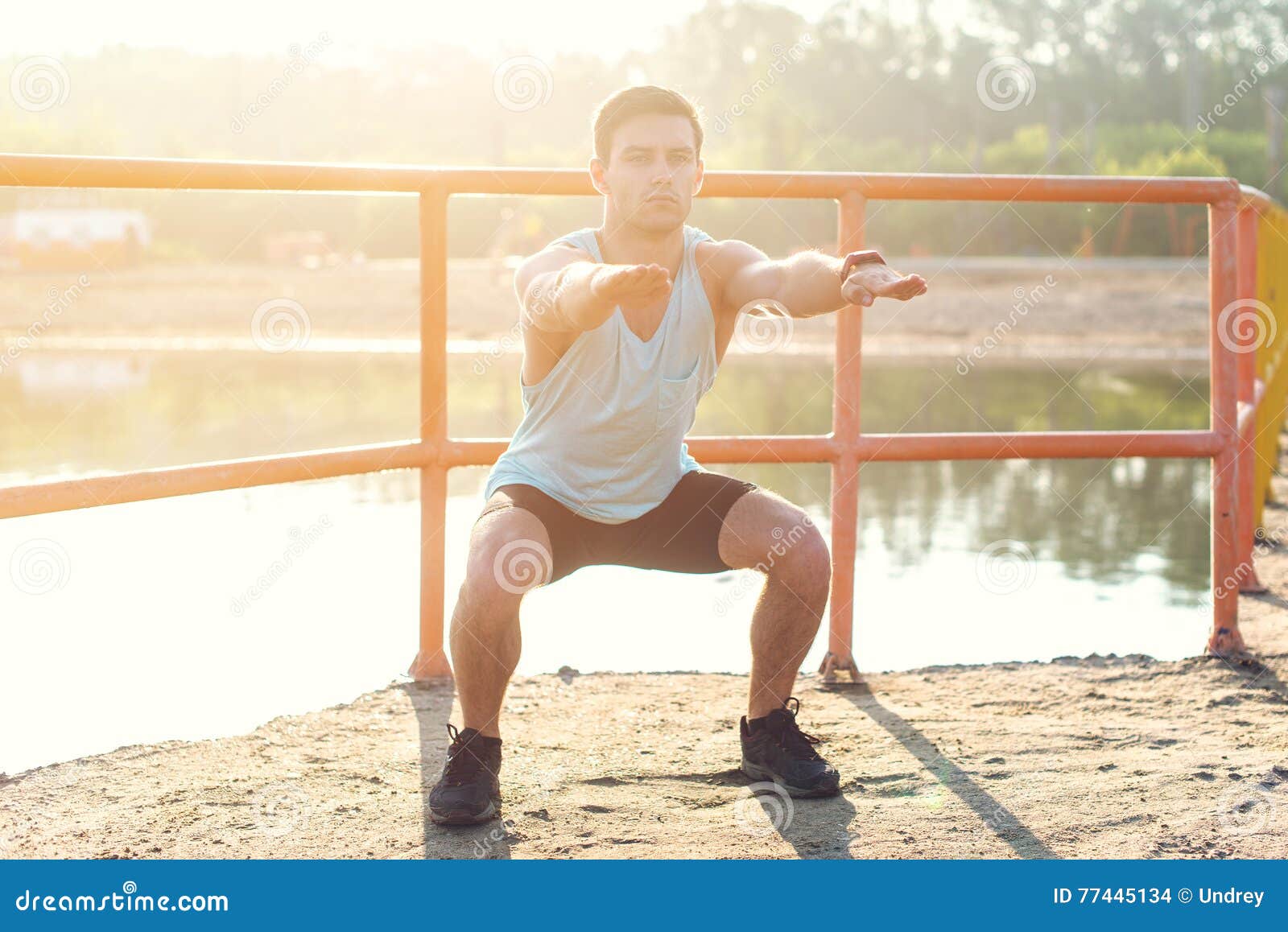 Fit Man Working Out Glutes with Bodyweight Workout Doing Squat ...