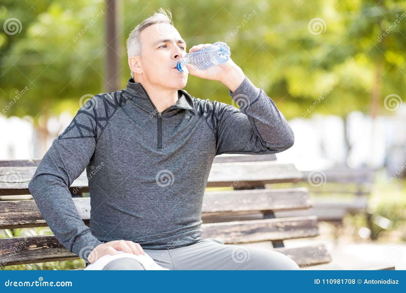 Mature Man Drinking Water To Refresh after a Workout Stock Photo ...