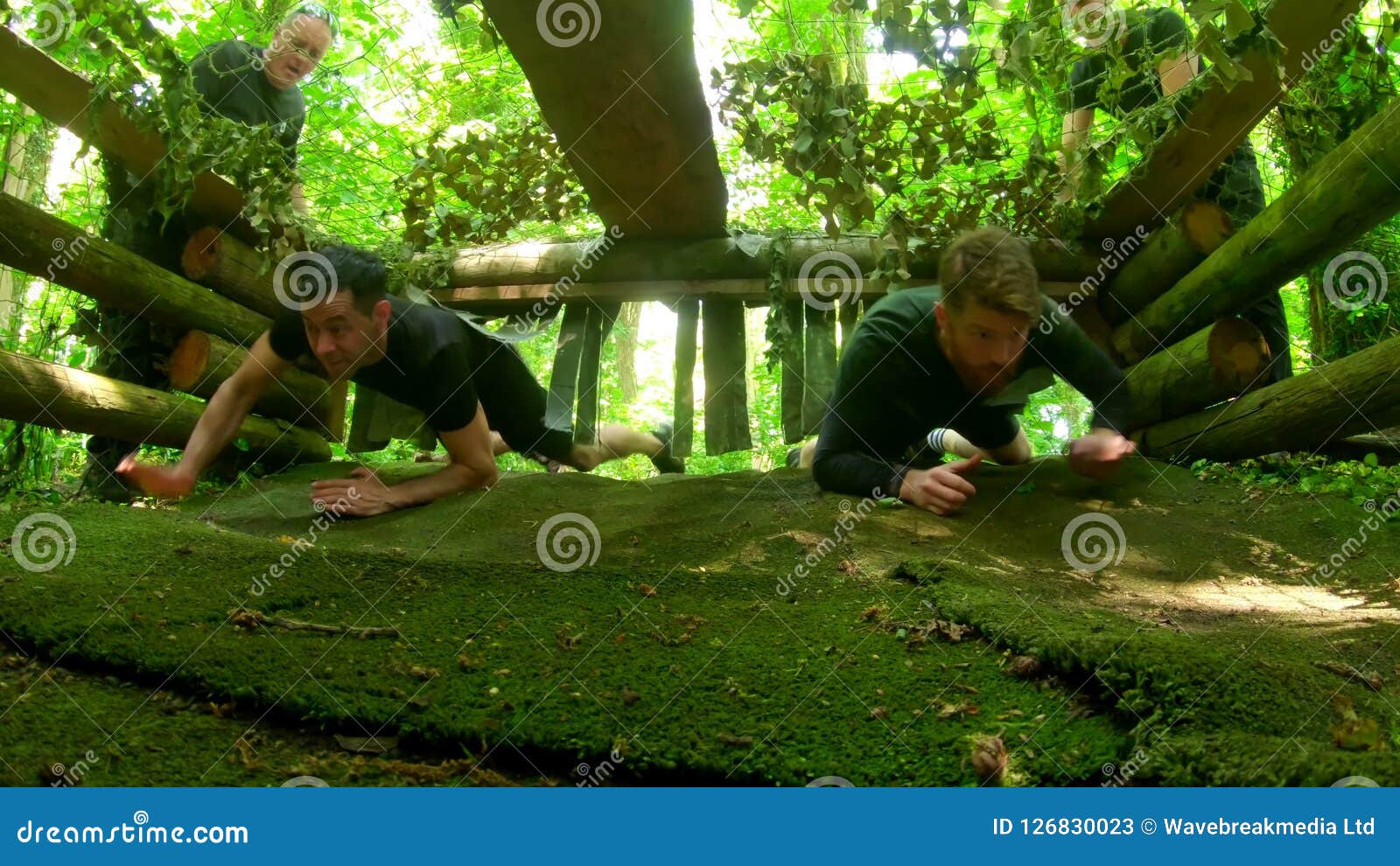 Fit Men Crawling Under the Net during Obstacle Course 4k Stock Video ...