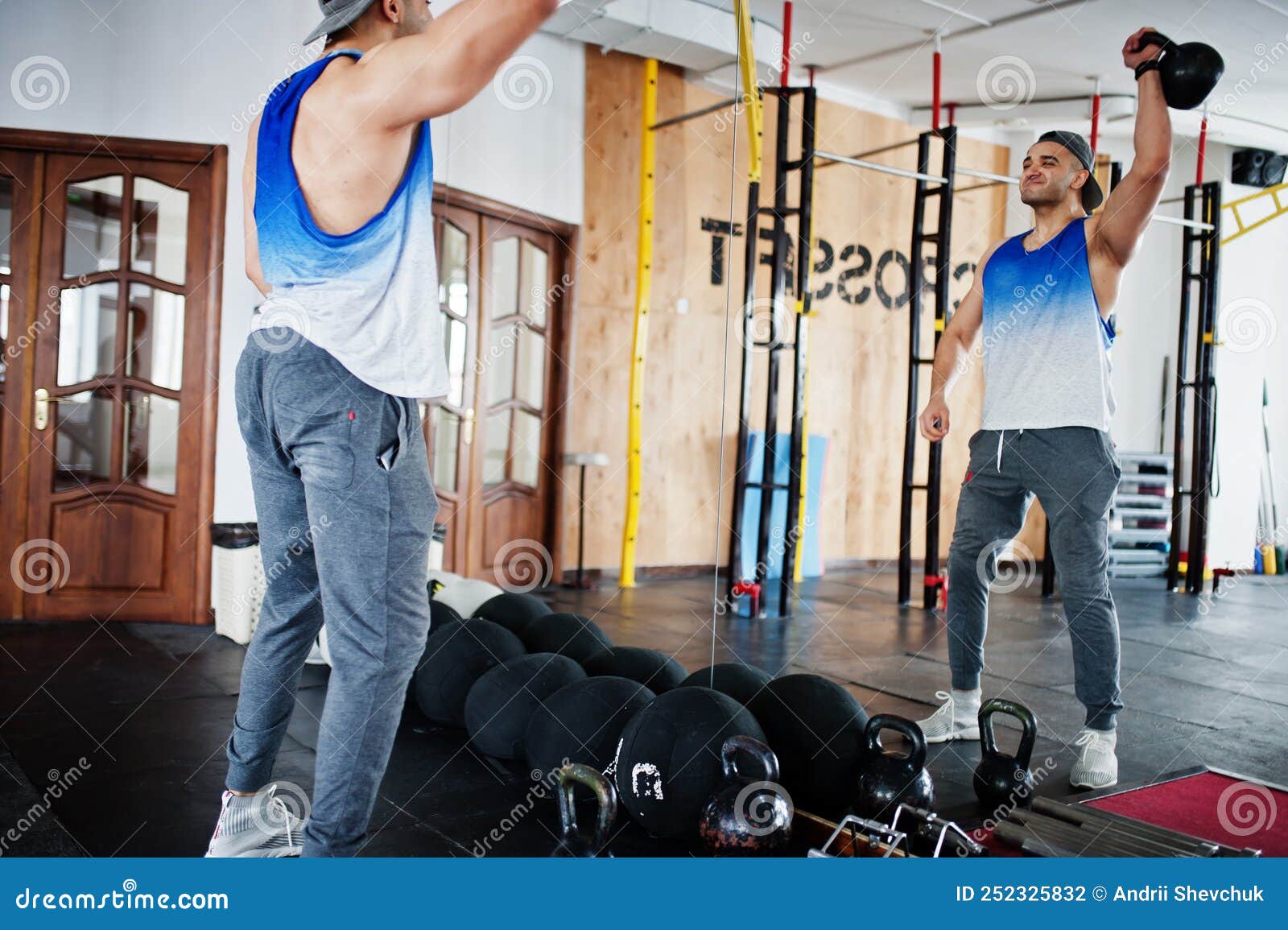 Fit and Muscular Arabian Man Doing Workouts in Gym Stock Photo - Image ...