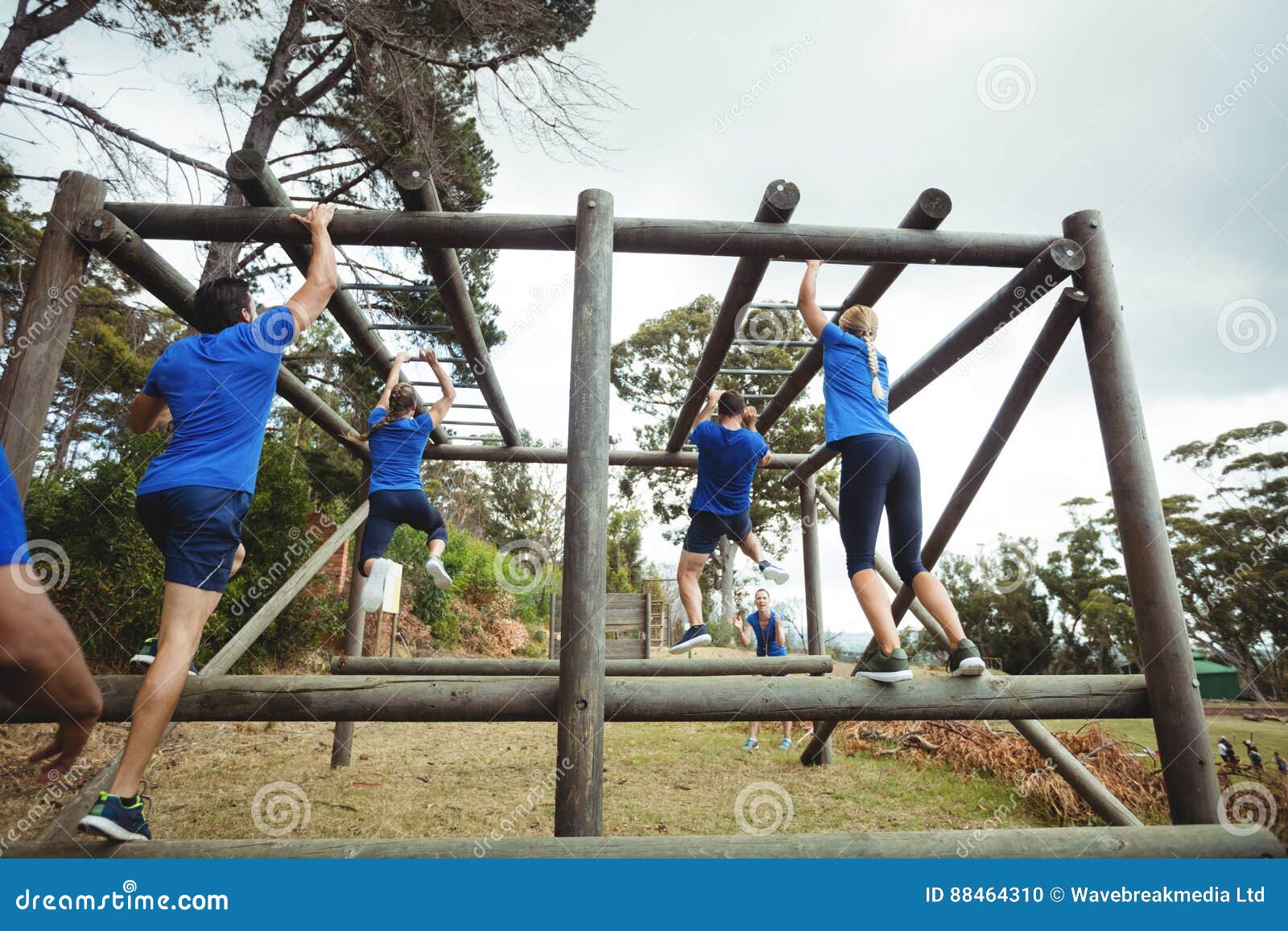 Fit People Climbing Monkey Bars in Bootcamp Stock Photo - Image of ...