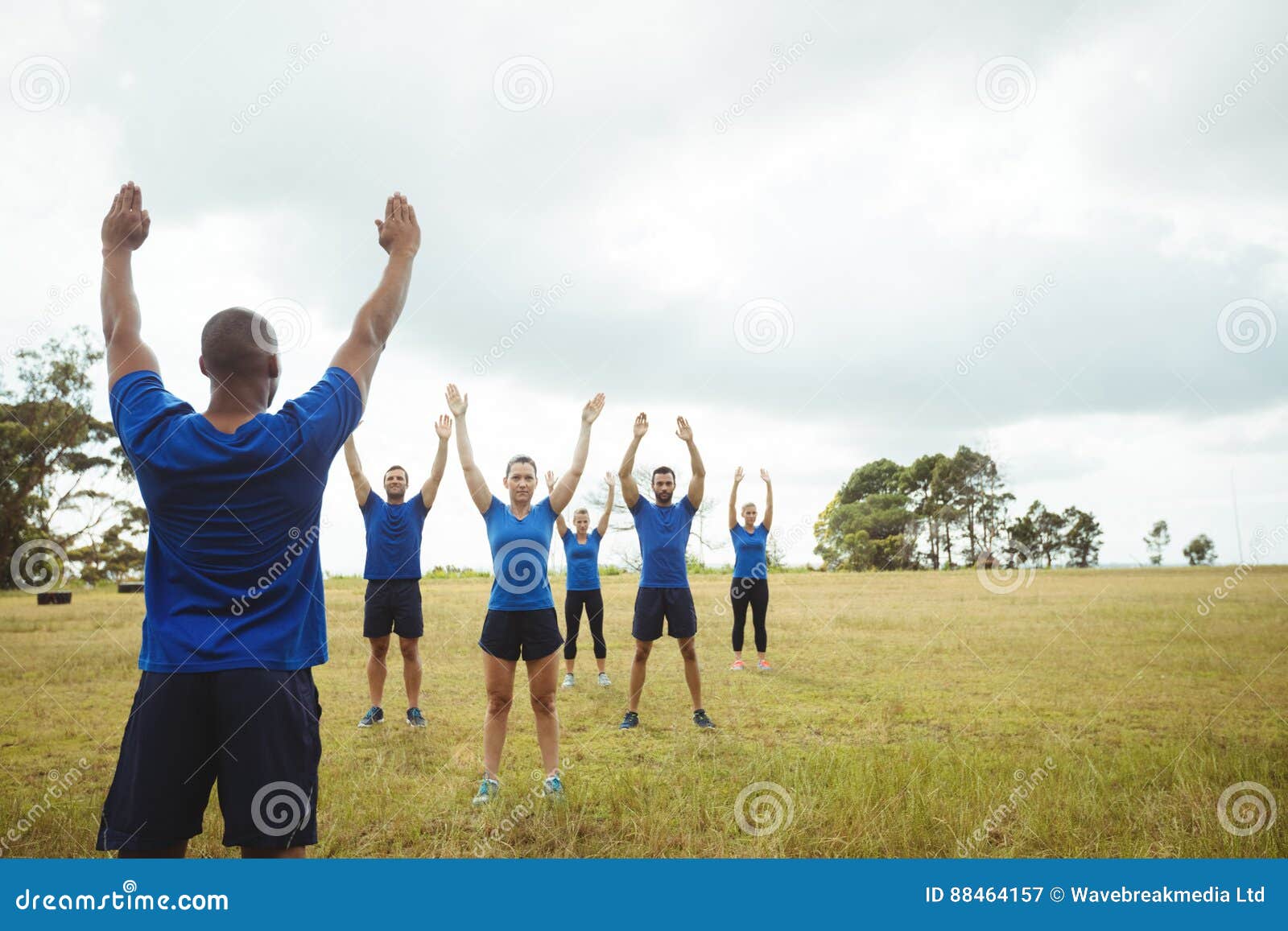 Fit People Performing Stretching Exercise Stock Image - Image of ...