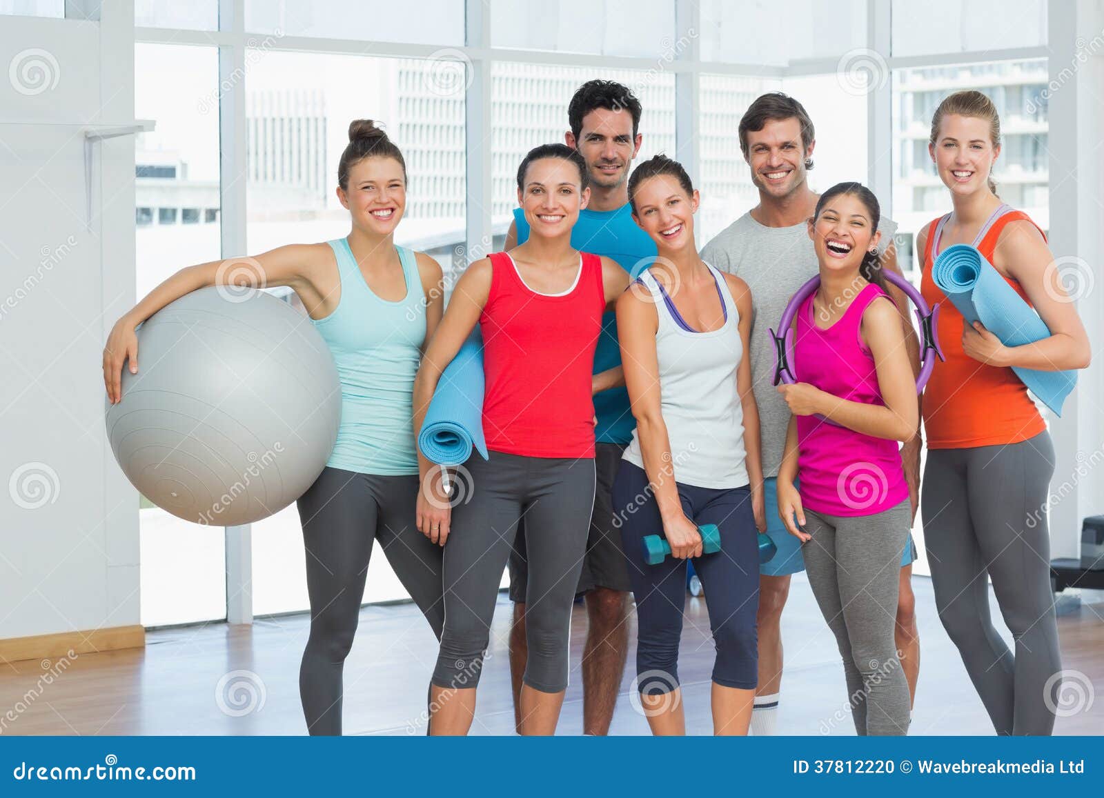 Fit People Smiling in a Bright Exercise Room Stock Photo - Image of ...