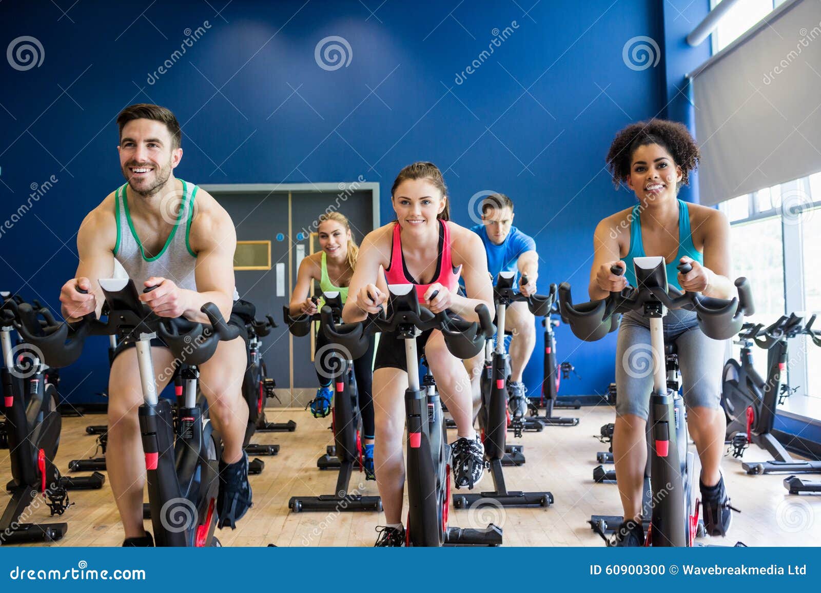 Fit people in a spin class stock photo. Image of happy - 60900300