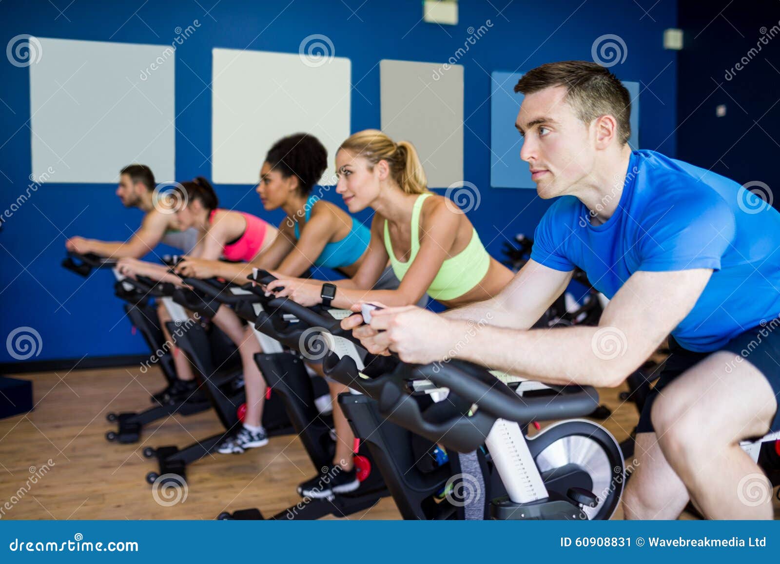 Fit people in a spin class stock image. Image of physical - 60908831