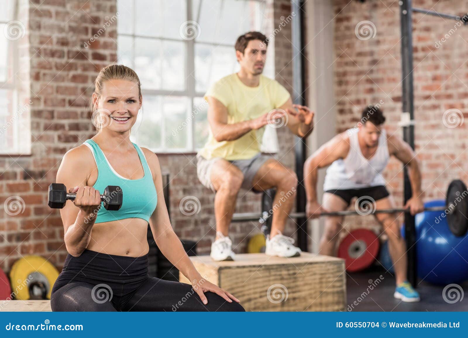 Fit People Working Out in Gym Stock Photo - Image of exercising ...