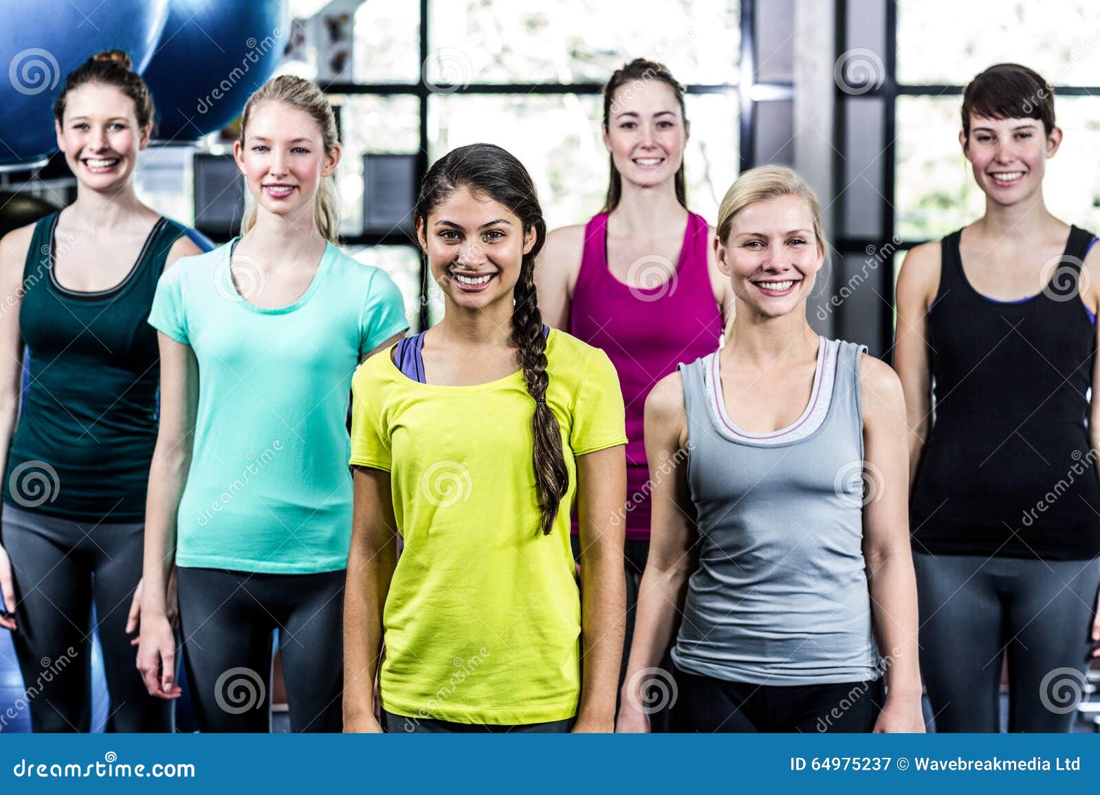Fit Smiling Group Standing Straight Stock Image - Image of healthy ...