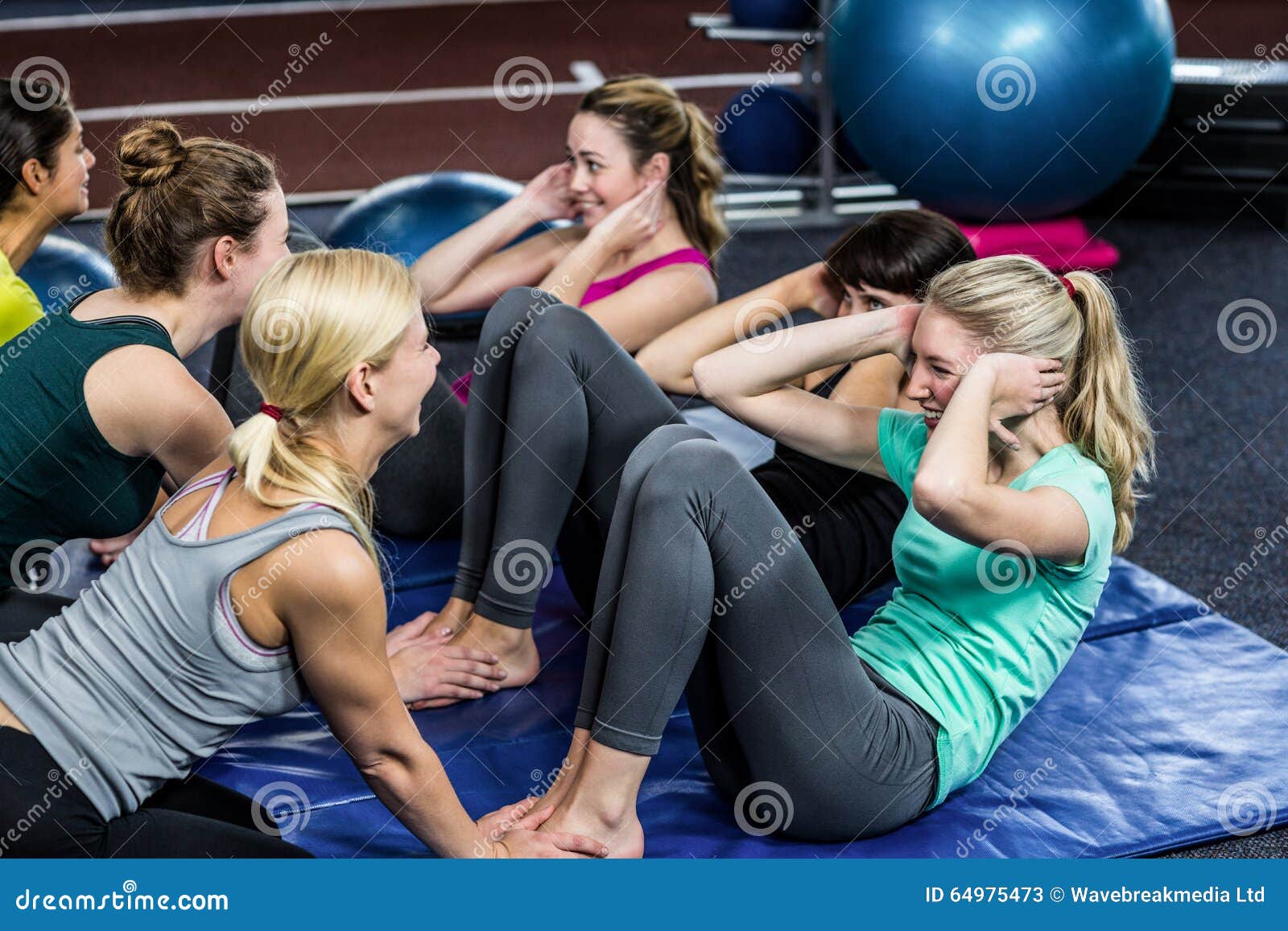 Fit Smiling Group Working Abs Stock Image - Image of fitness, beautiful ...