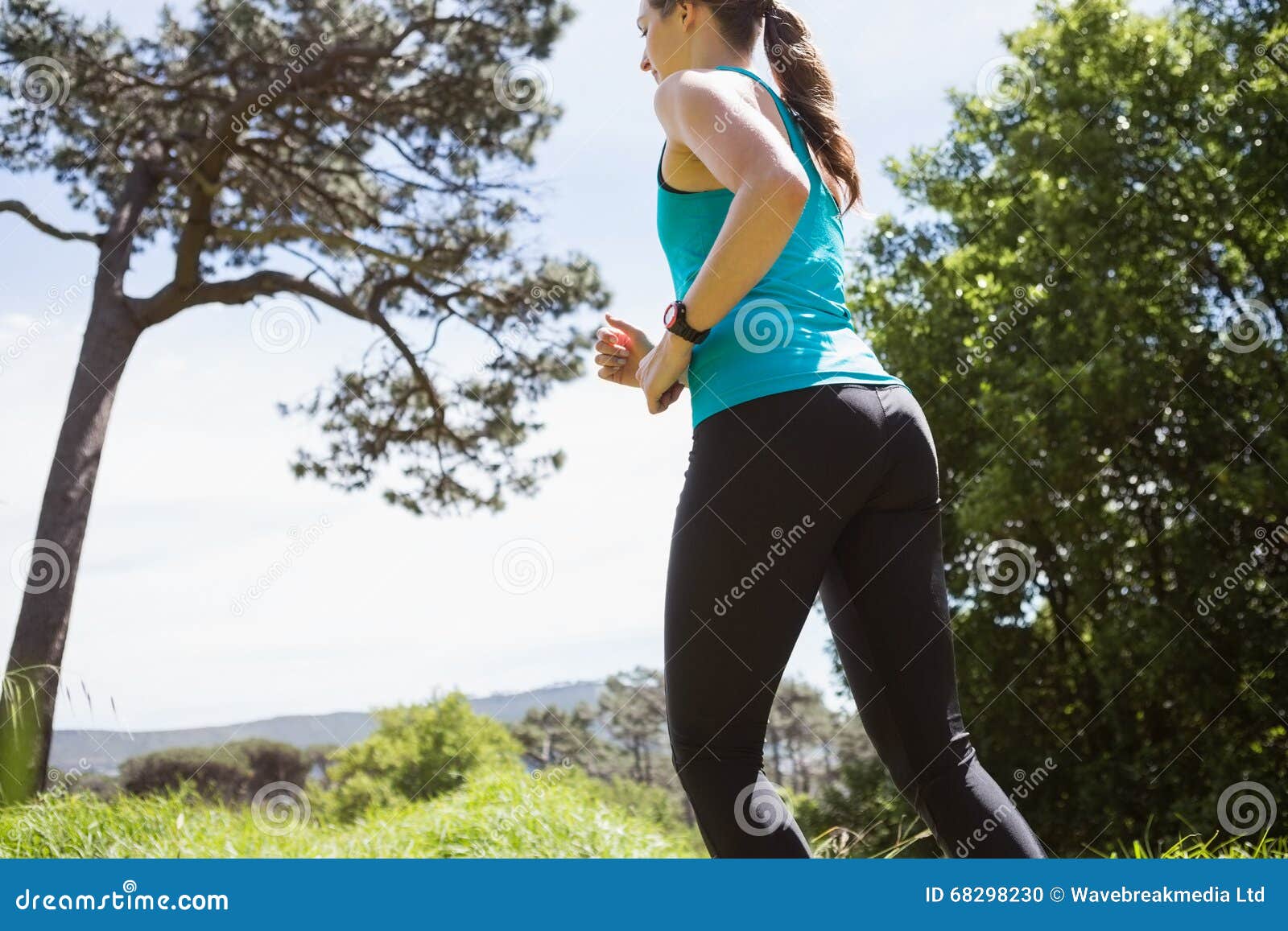 Fit smiling woman jogging stock photo. Image of exercises - 68298230