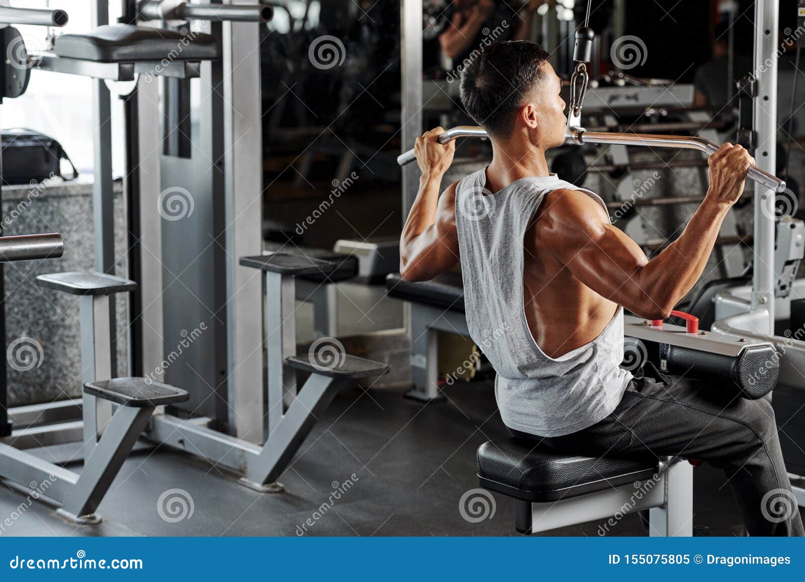 Man Exercising in Pull Down Machine Stock Image - Image of wellbeing ...