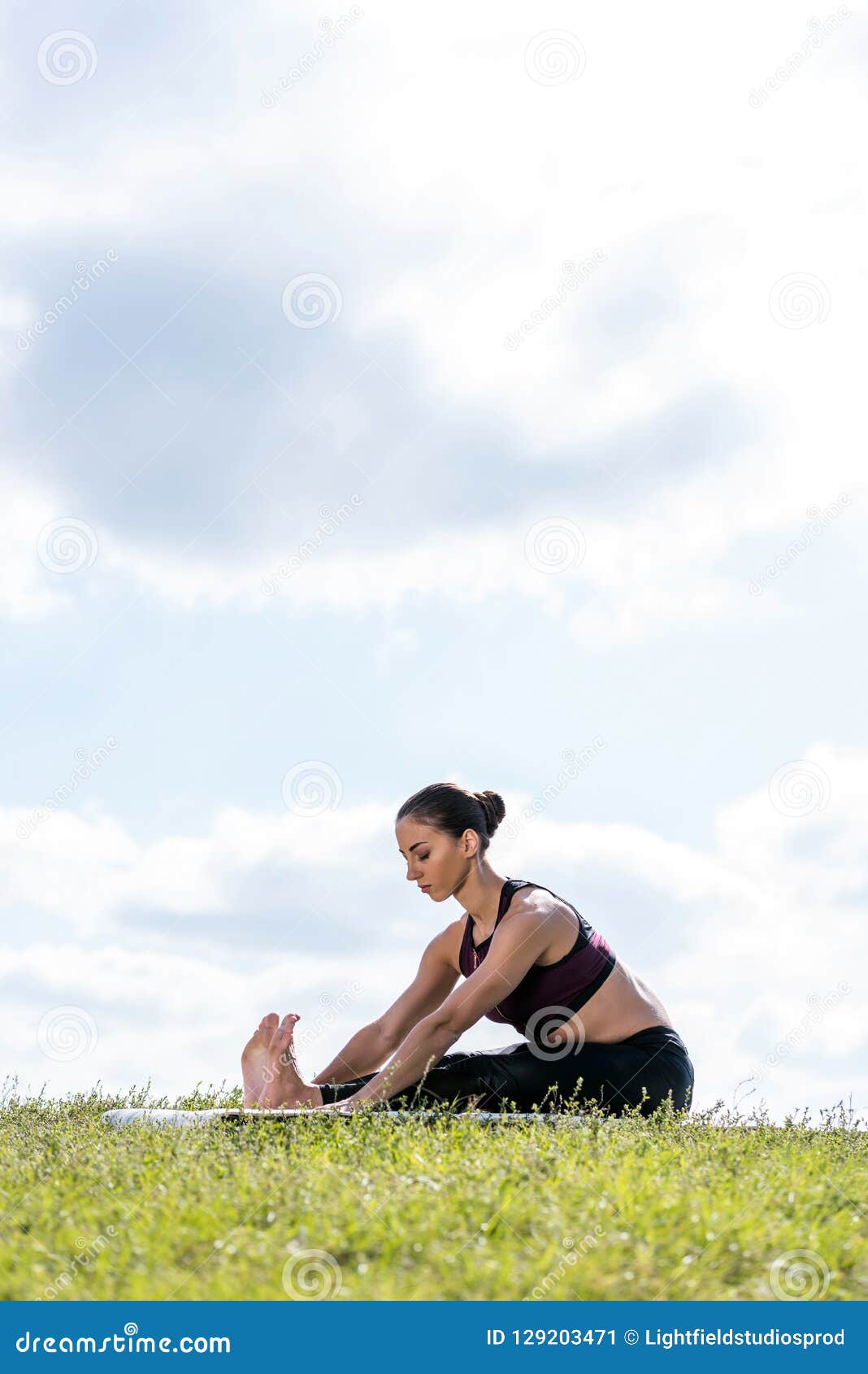 Fit Woman Bending Forward while Practicing Stock Image - Image of ...