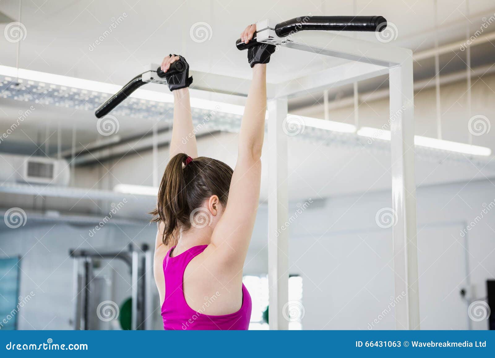 Fit woman doing pull up stock image. Image of slim, athletic - 66431063