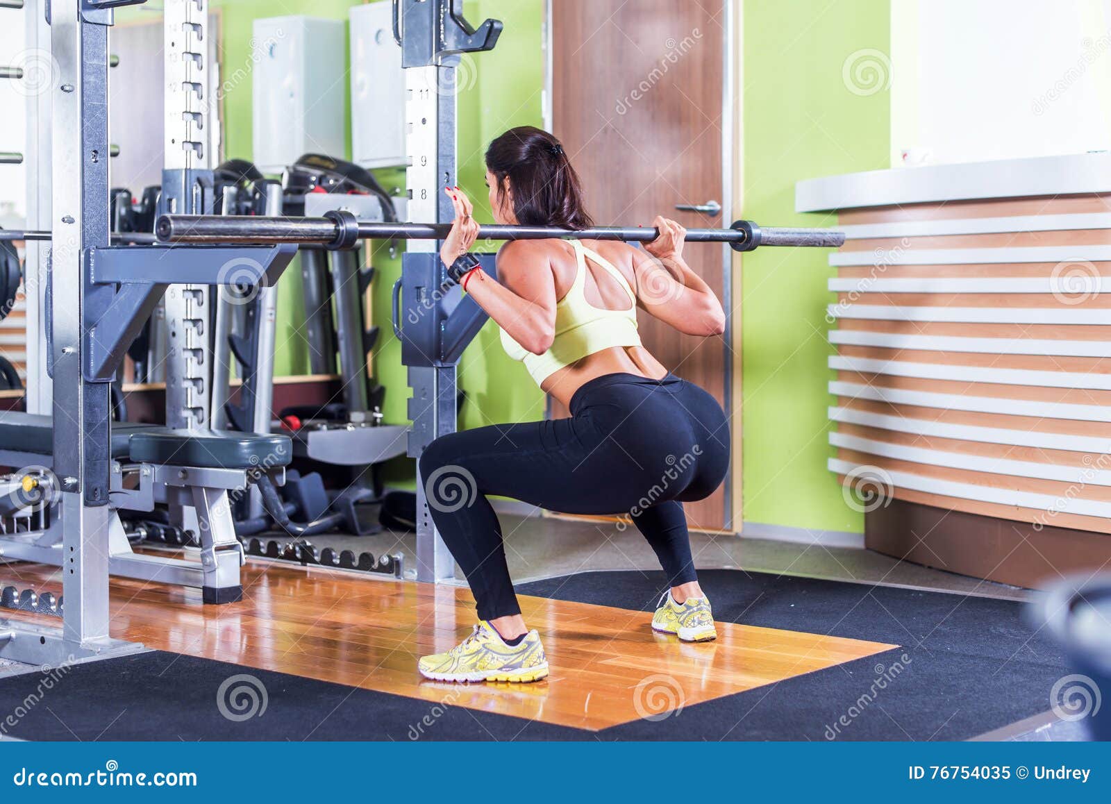 Fit Woman Doing Squat With Barbell In The Gym Stock Image Image Of