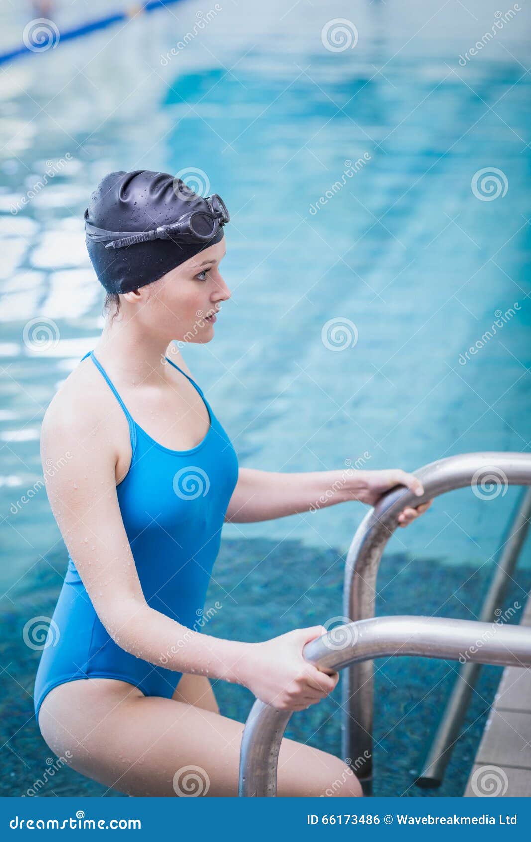 Fit Woman Getting Out of the Water Stock Photo - Image of poolside ...