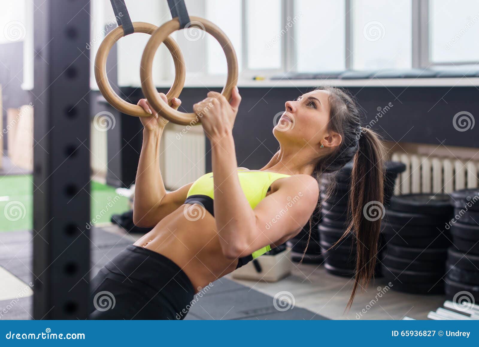 Fit Woman Going Pull-ups with Gymnastic Rings in Gym Stock Image ...